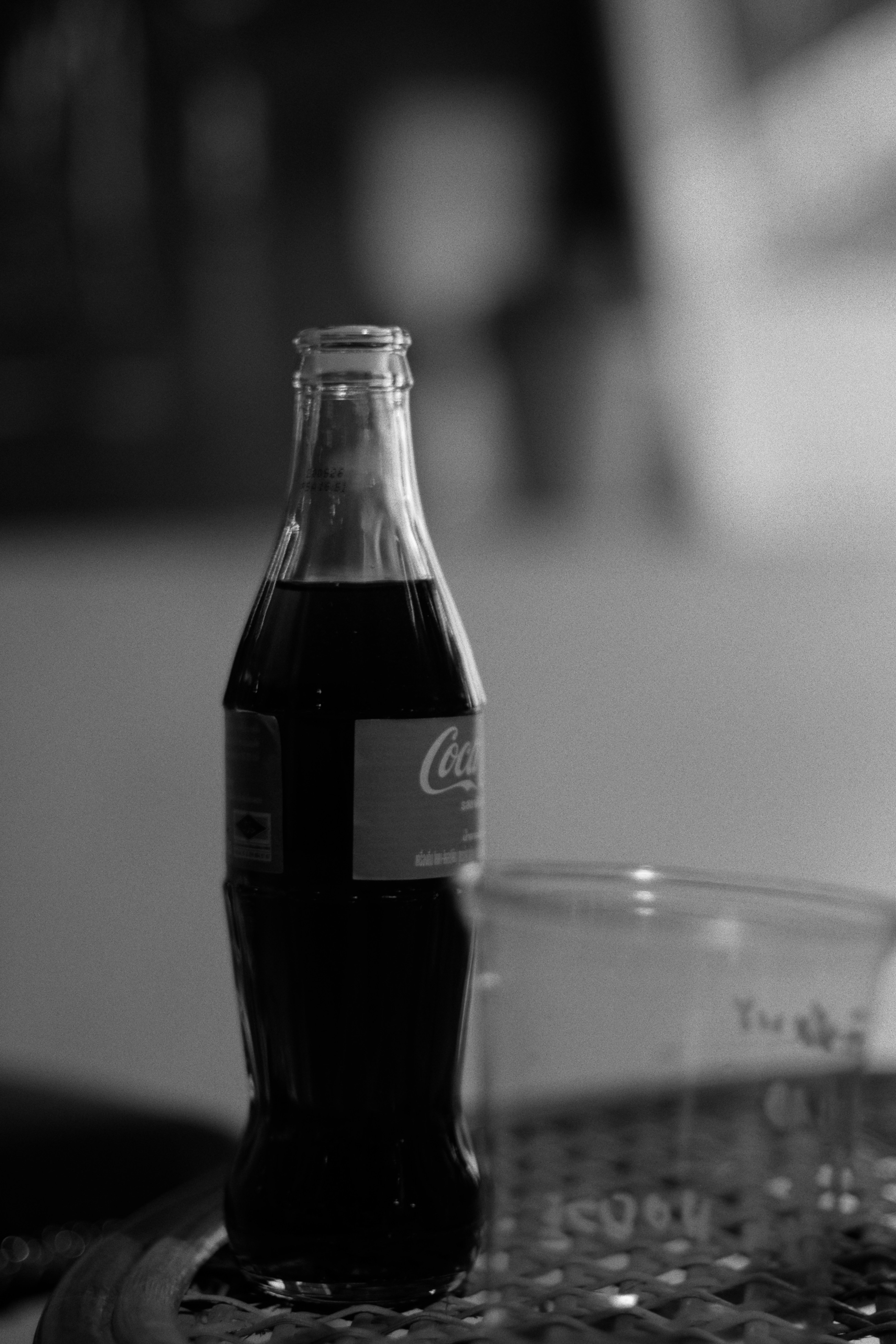 A Quiet Toast: Classic Coke Bottle in Soft Focus Home Studio