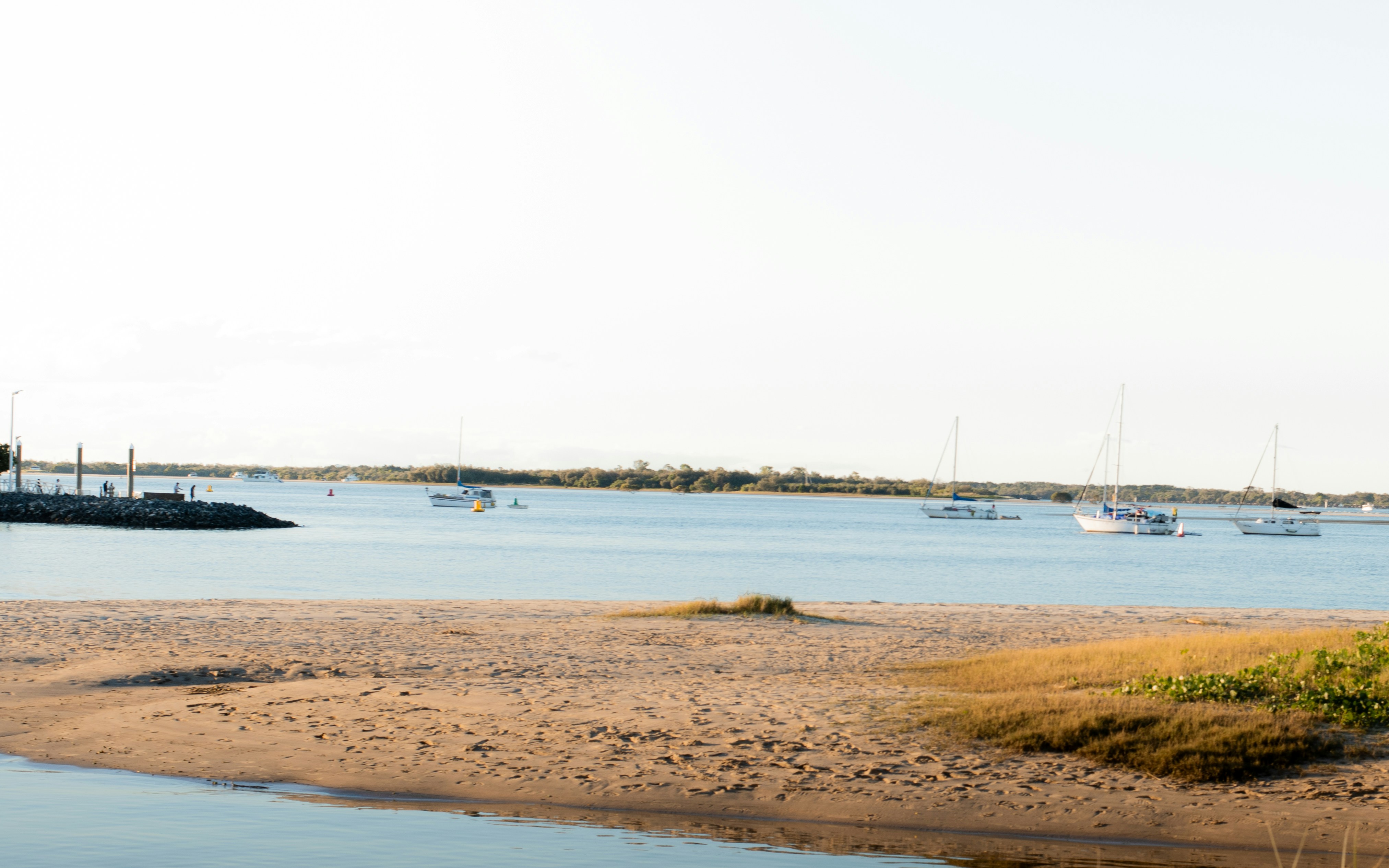 Quiet Coastal Vista with Sails at Dusk