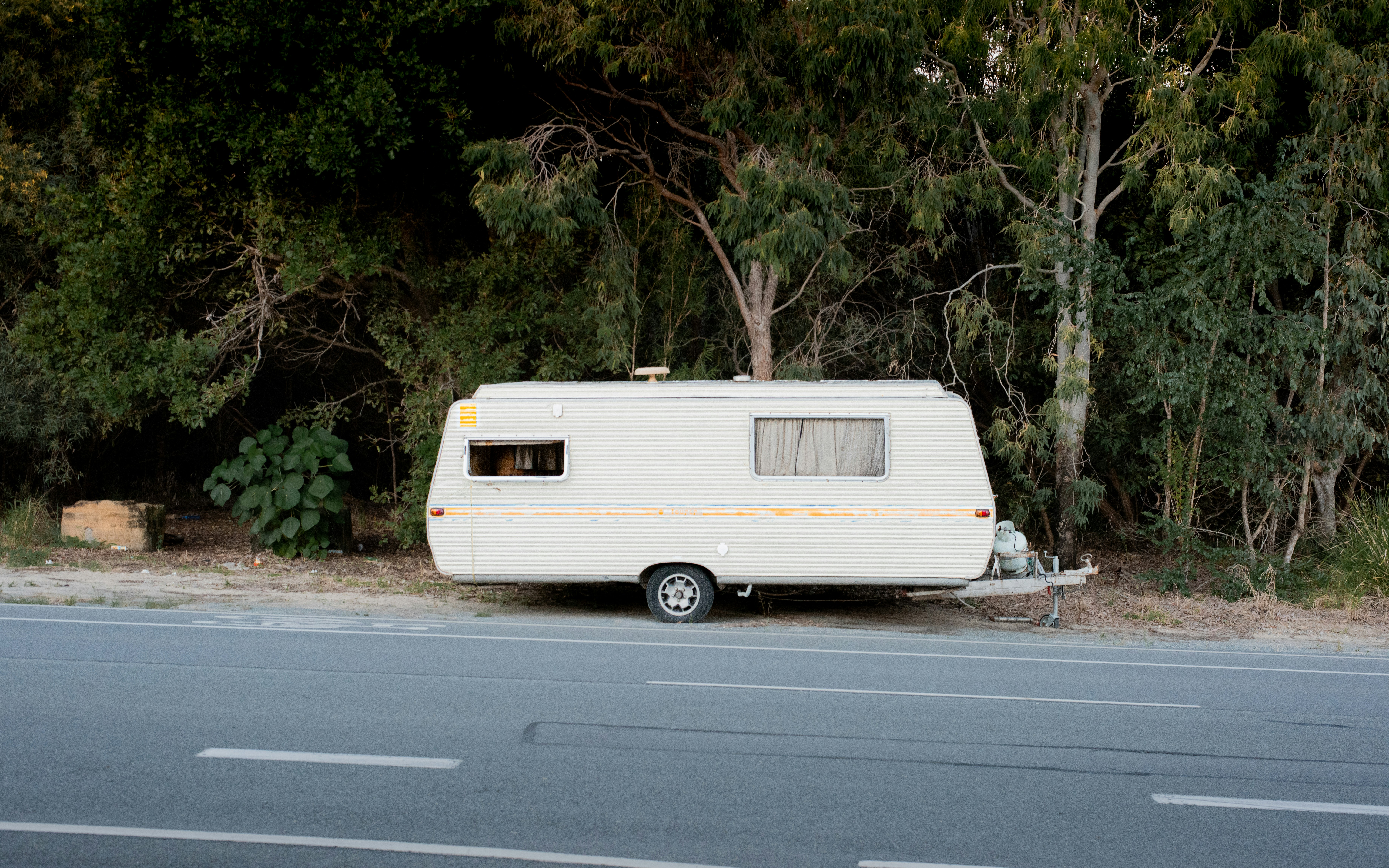 Lonely Caravan Resting Along a Quiet Road