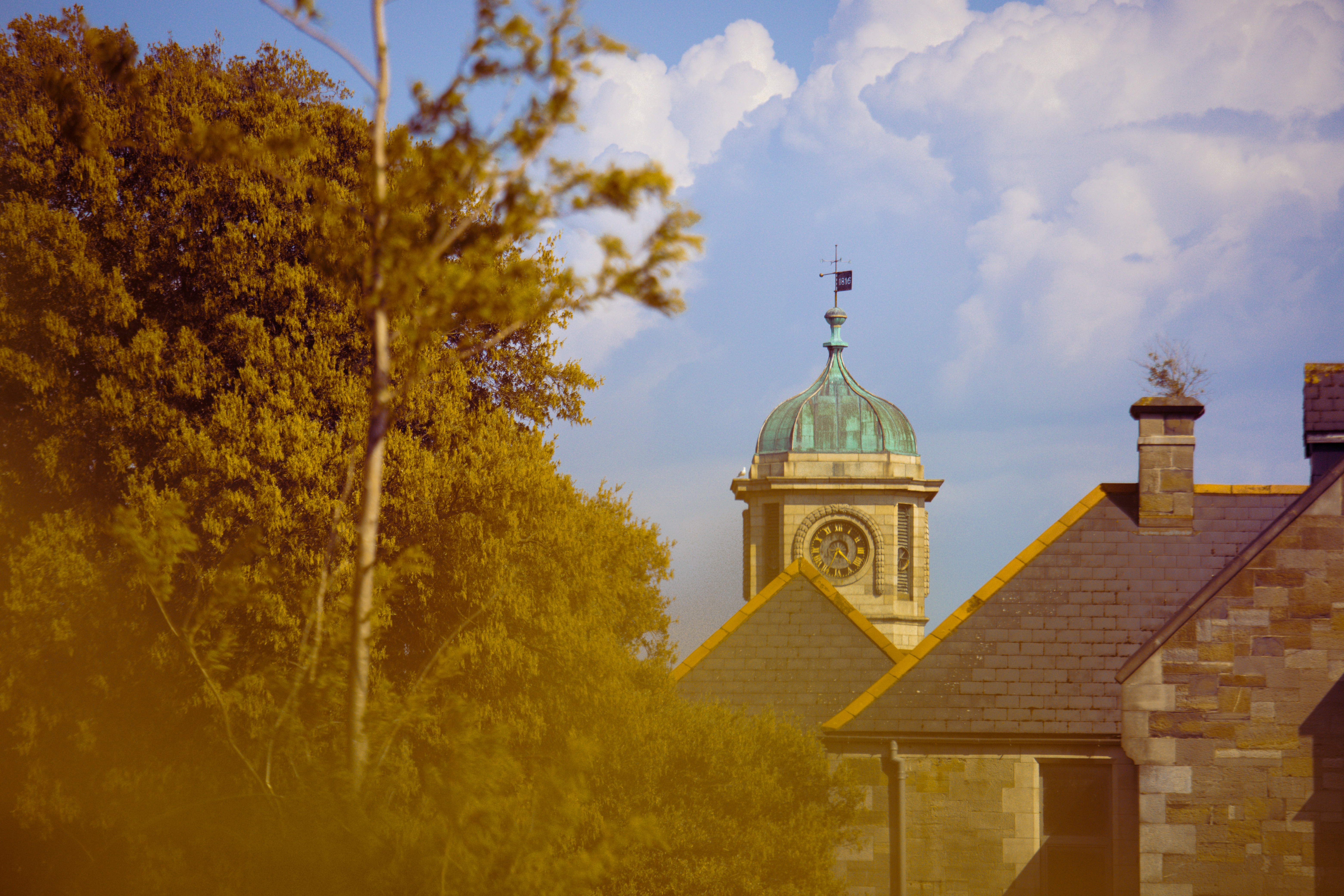 Clock Tower in Golden Hour: A Quiet Campus Edge