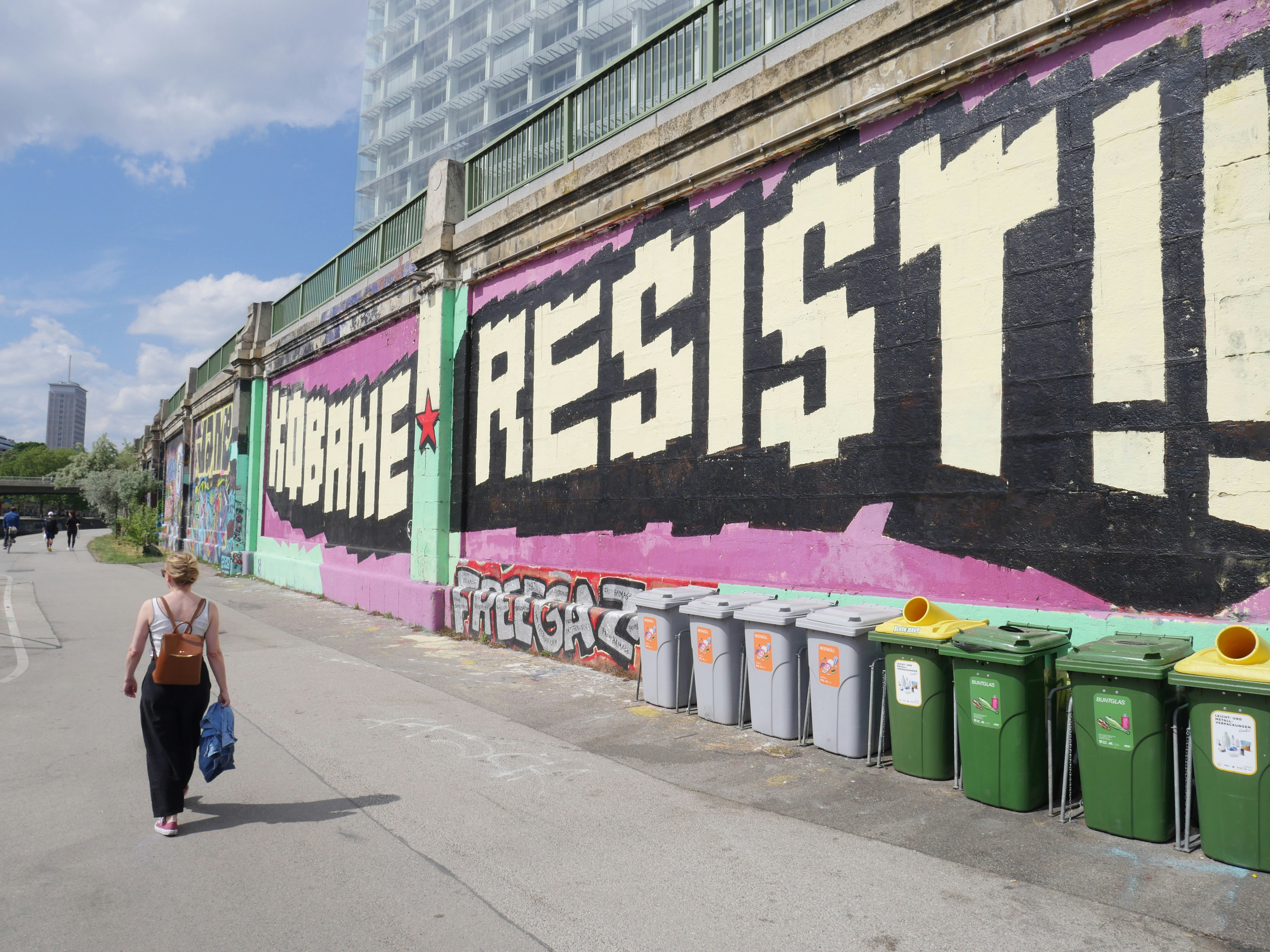 Graffiti Wall Walk: A Quiet Moment Beside the Painted Mile