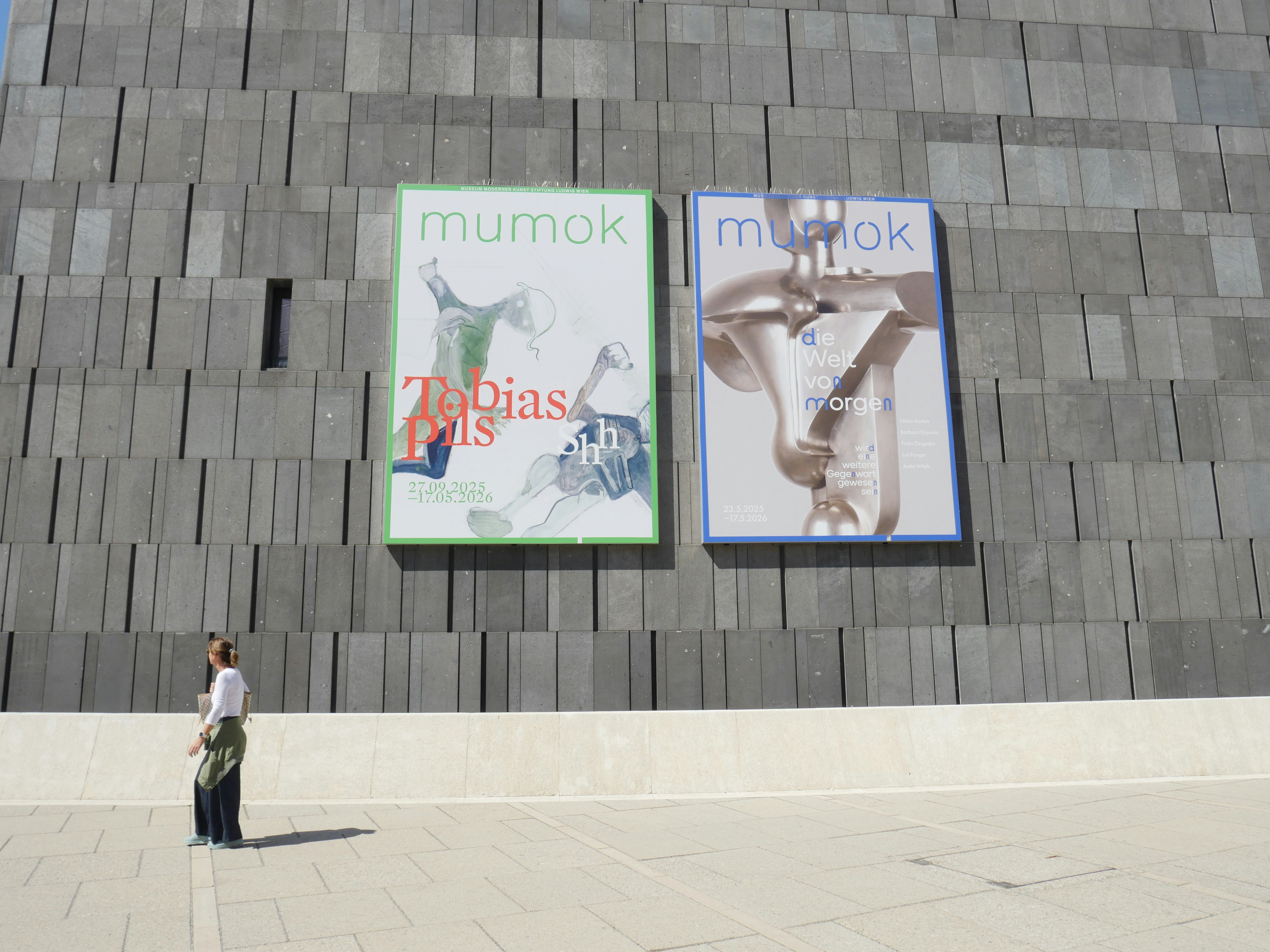 Runner at the Base of a Facade: A Quiet Moment by the Blocky Wall