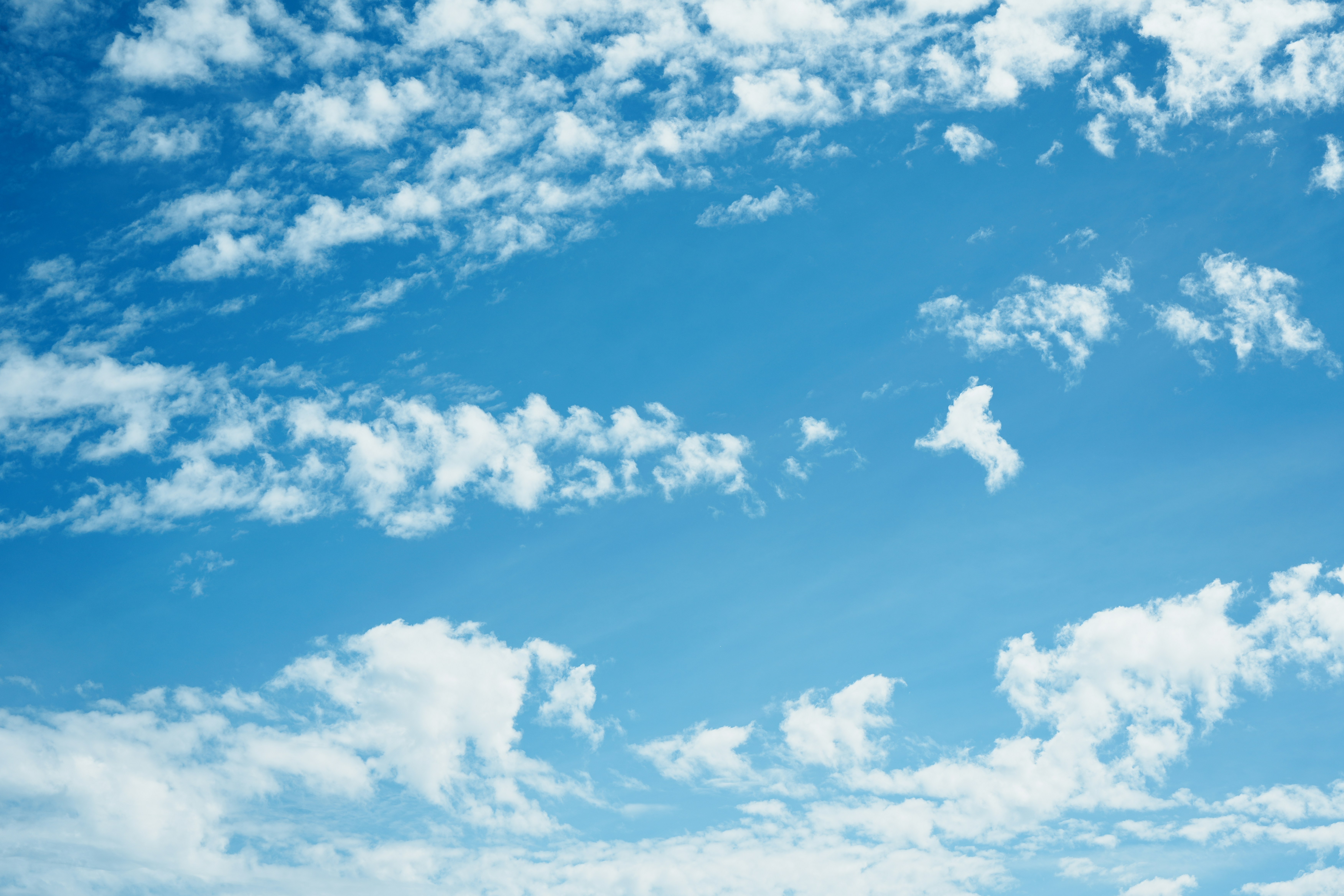 Sky Mosaic: A Quiet Canvas of Blue and Clouds