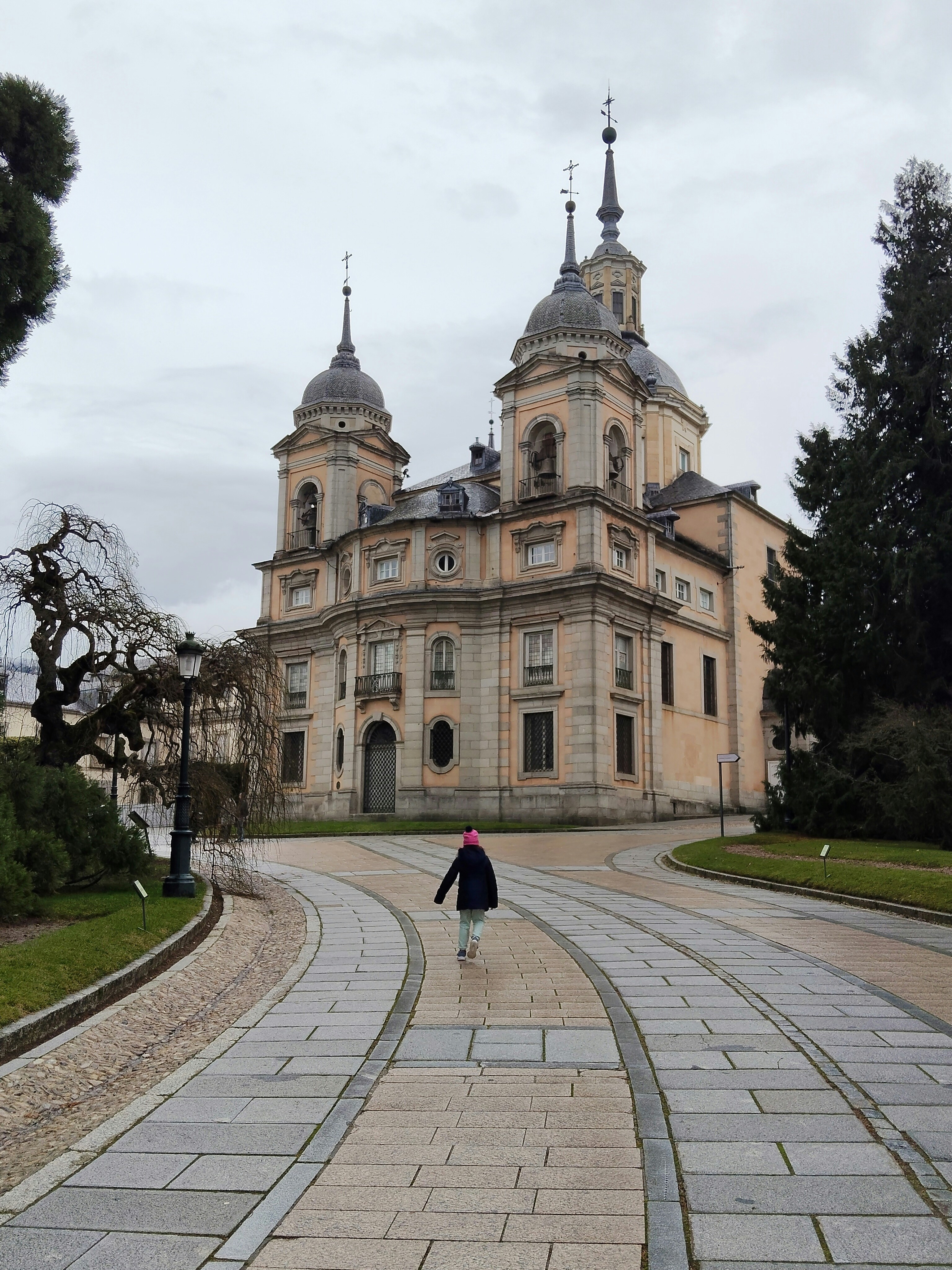 Path to the Baroque Fortress: A Child Walks Toward a Cathedral