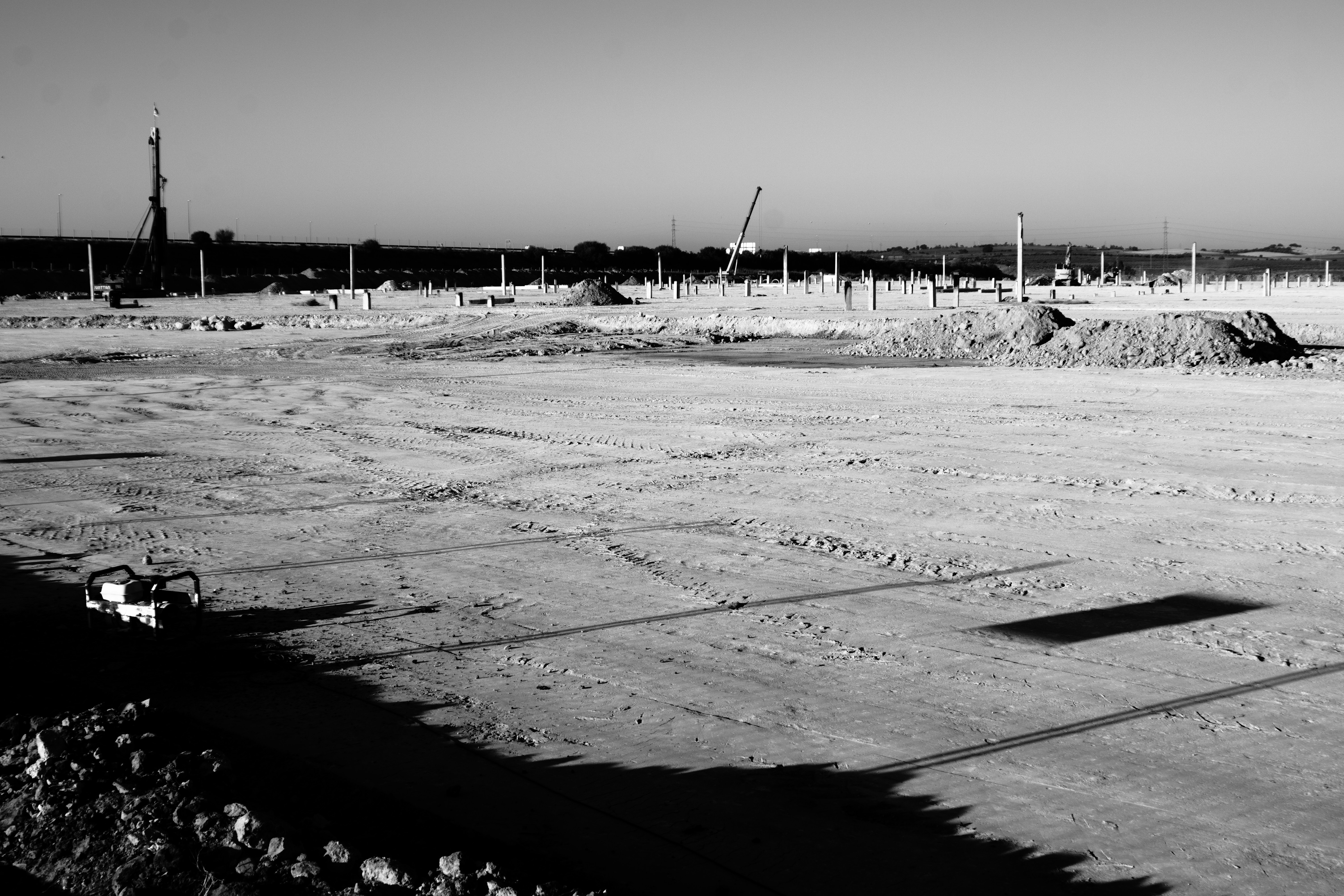 Deserted construction site under a low horizon