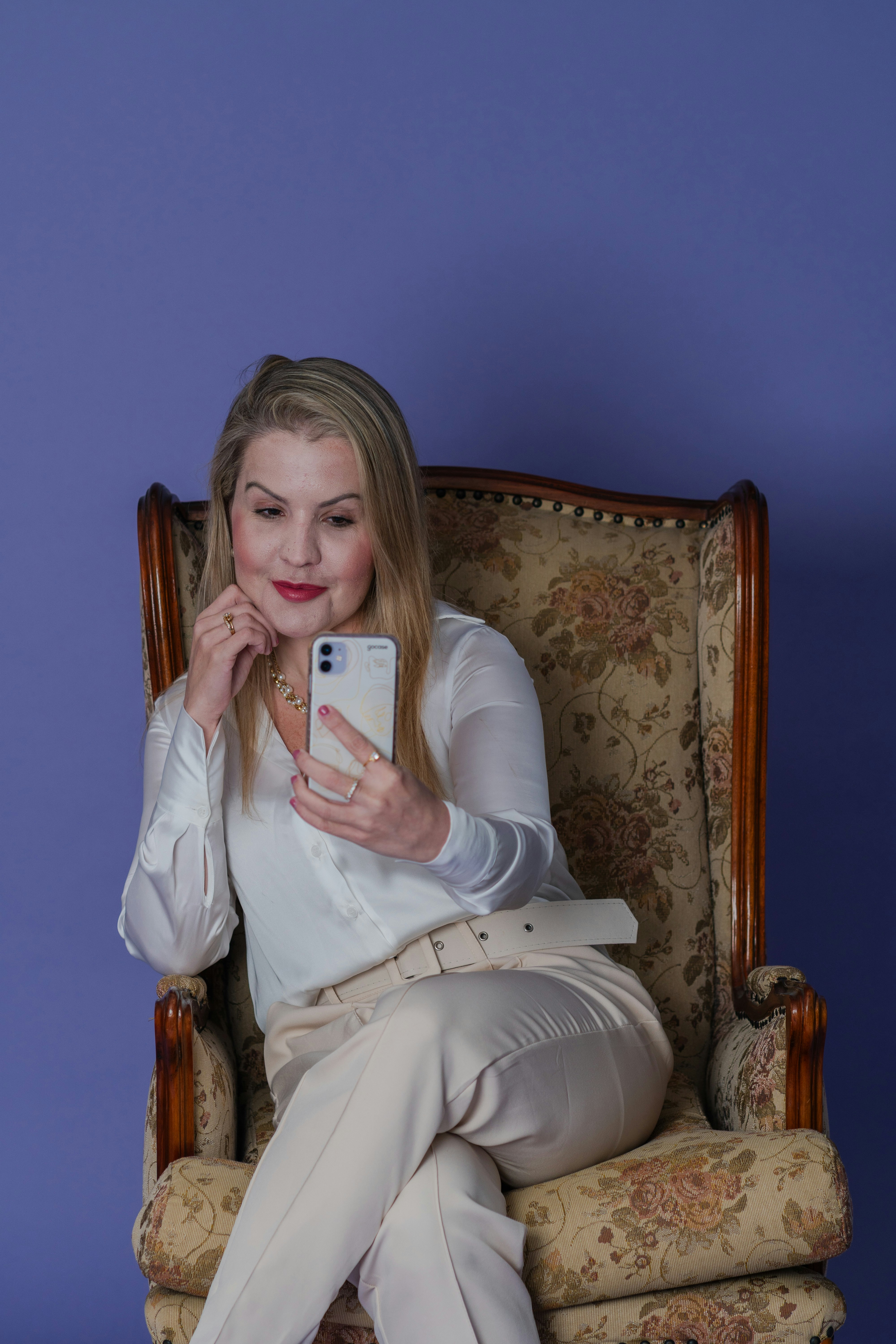 Selfie in a Regal Armchair: Quiet Confidence in Violet Studio
