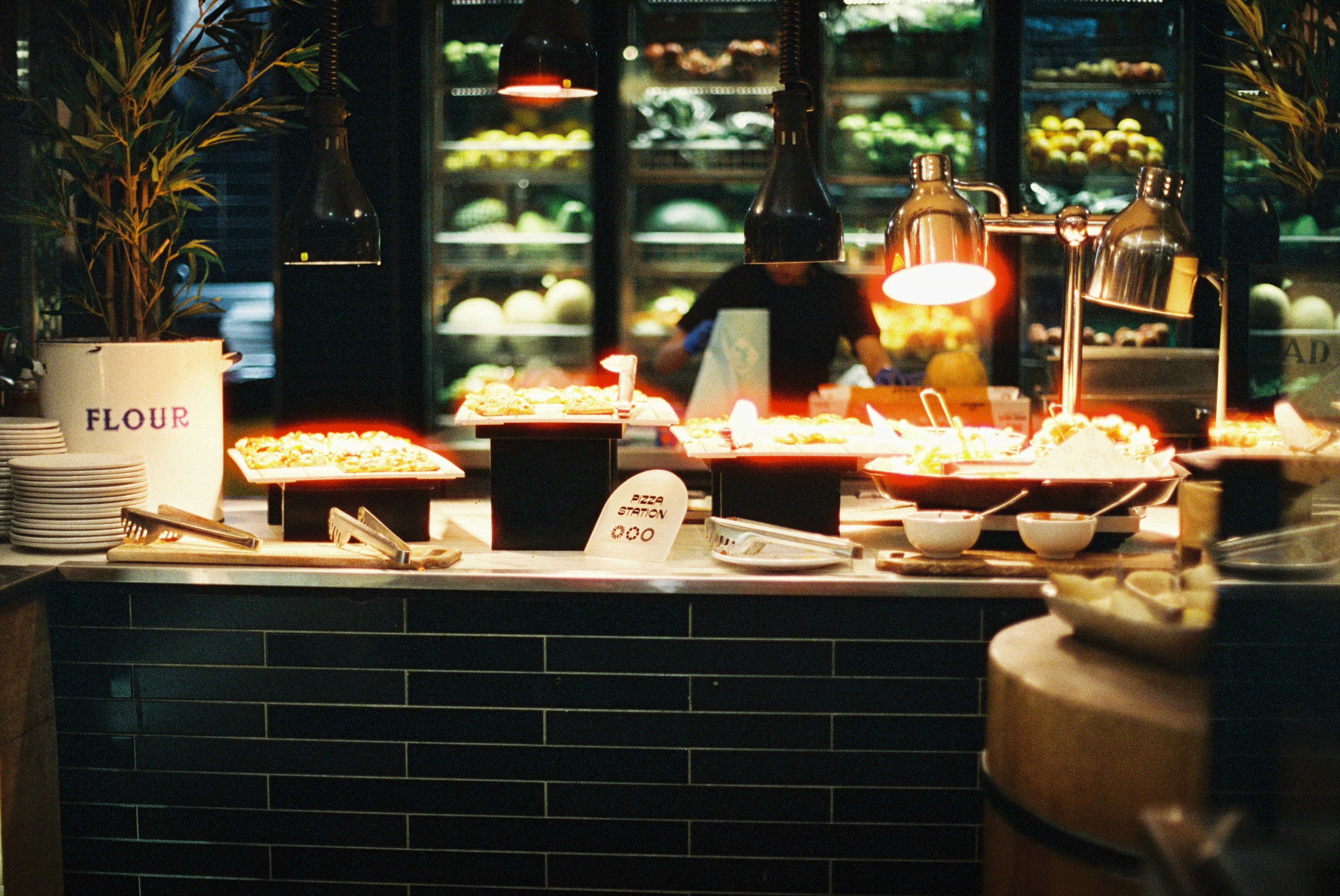 Warm Plate, Bright Delights: A Deli Buffet Under Soft Marmalade Light