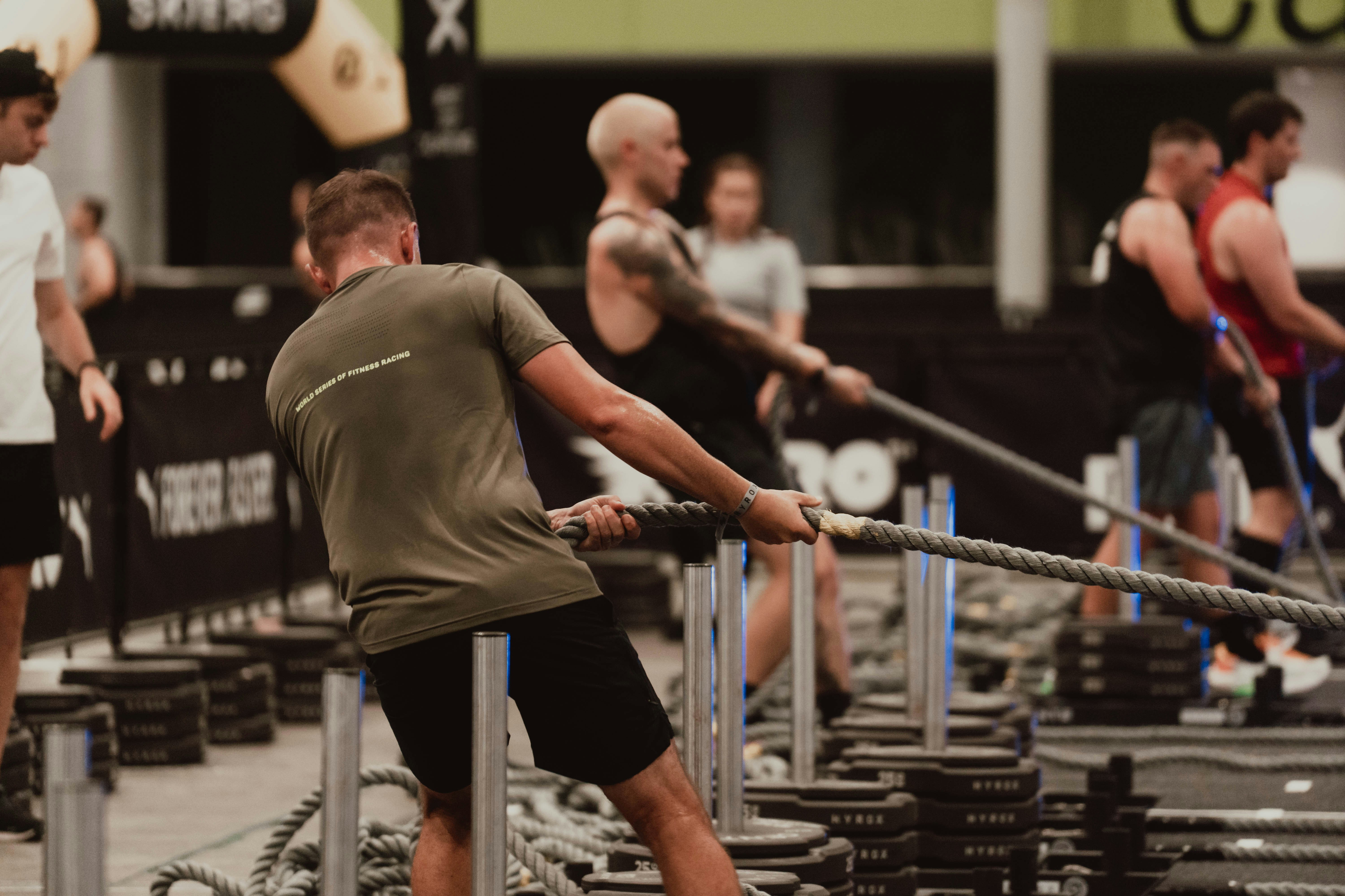 Ropes and Resolve: Athletes in a Row of Warped Alleys