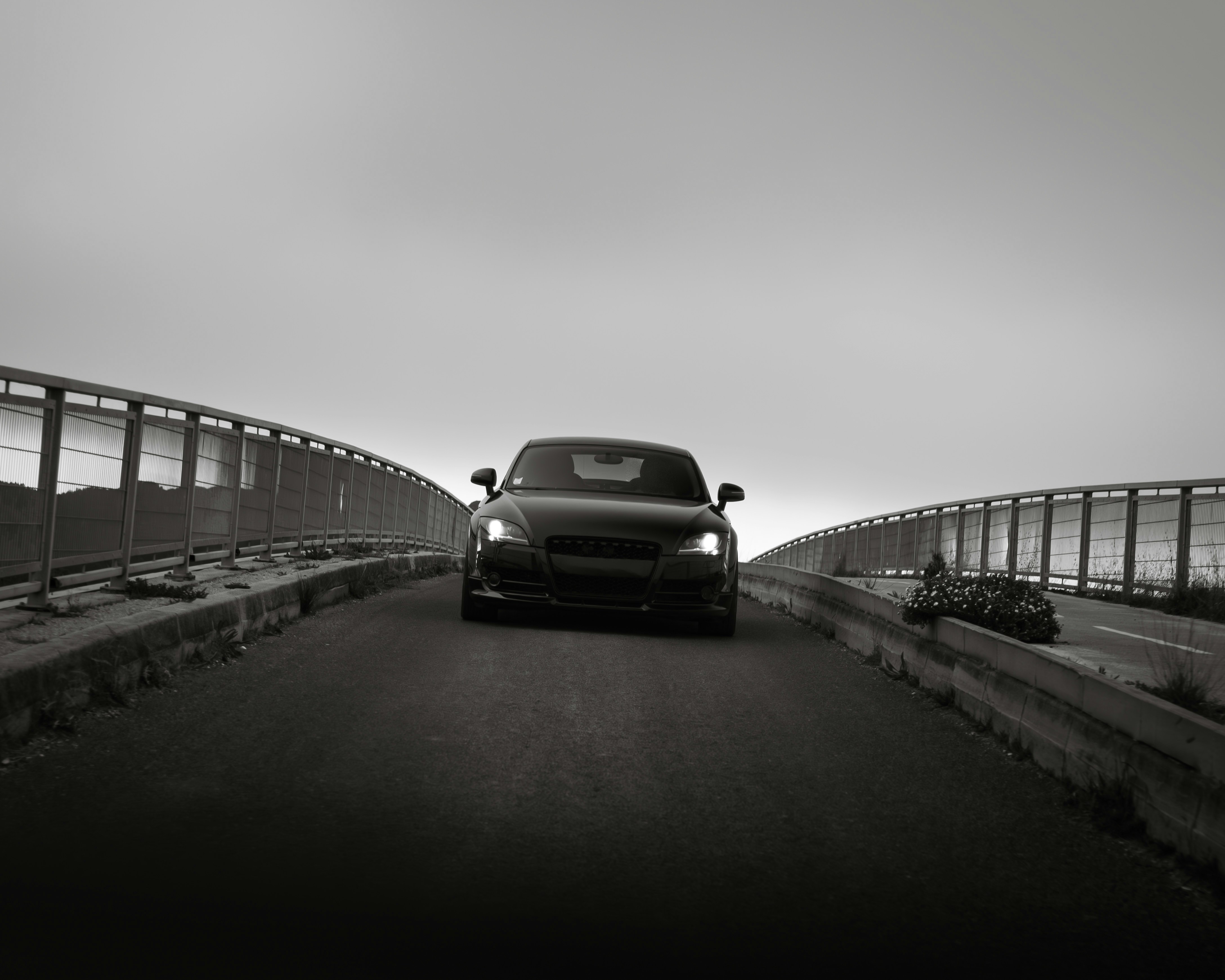 Midnight Arrow: A Suspenseful Drive Across a Narrow Span