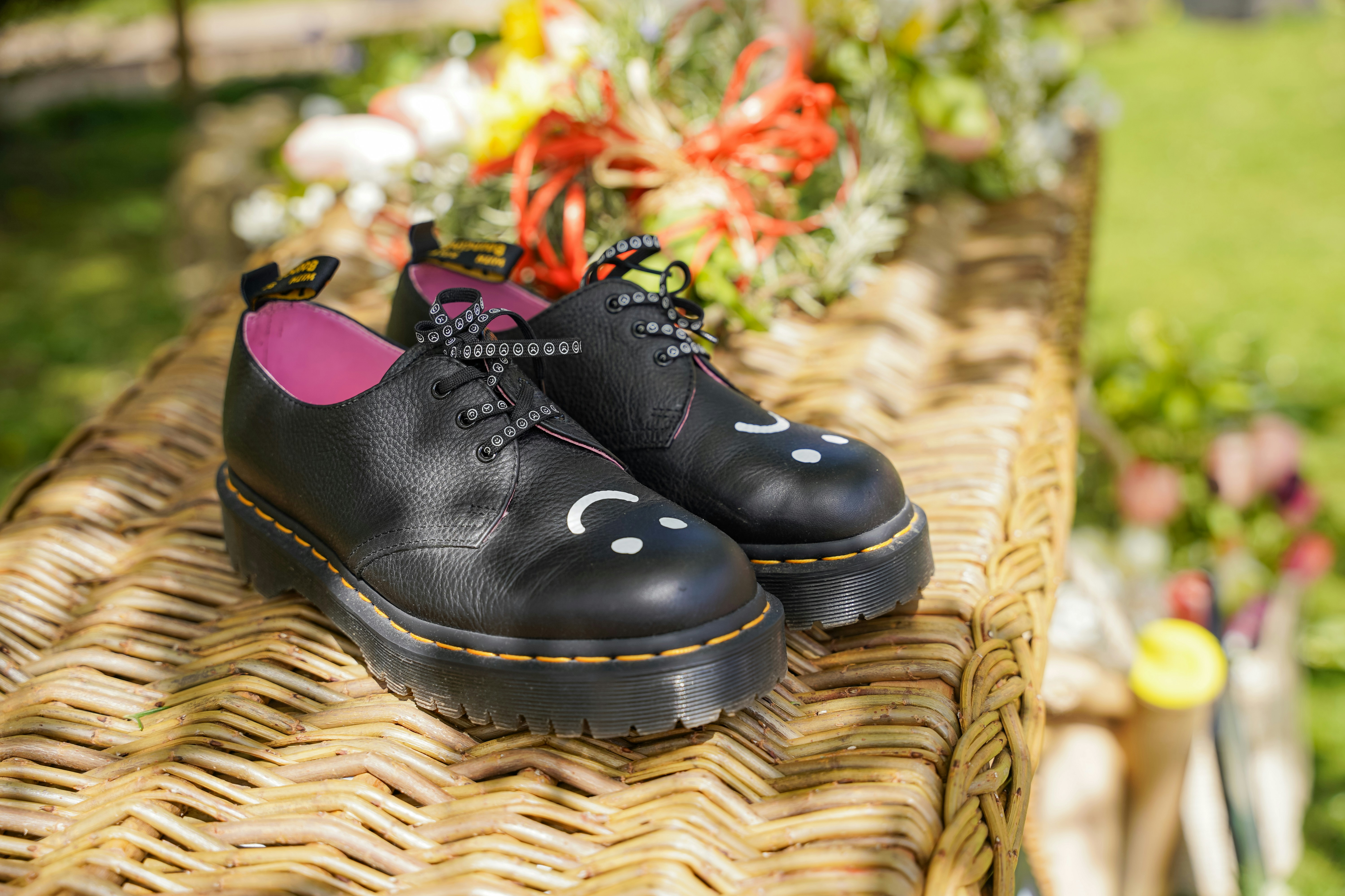 Leather Claws: A Pair of Black Brogues Resting on a Woven Basket