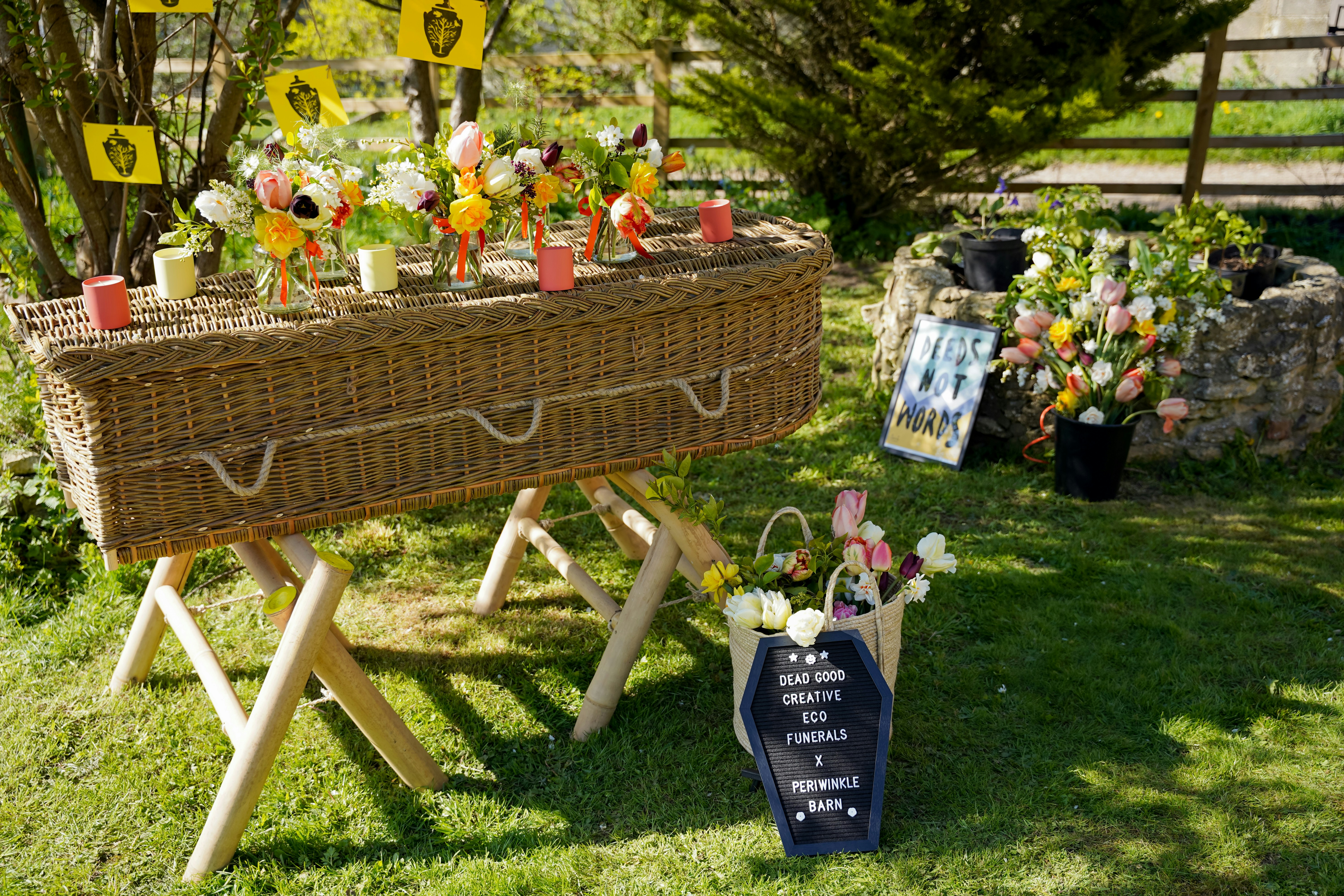 Sunny Celtic Farewell: A Rustic Coffin Display in the Garden