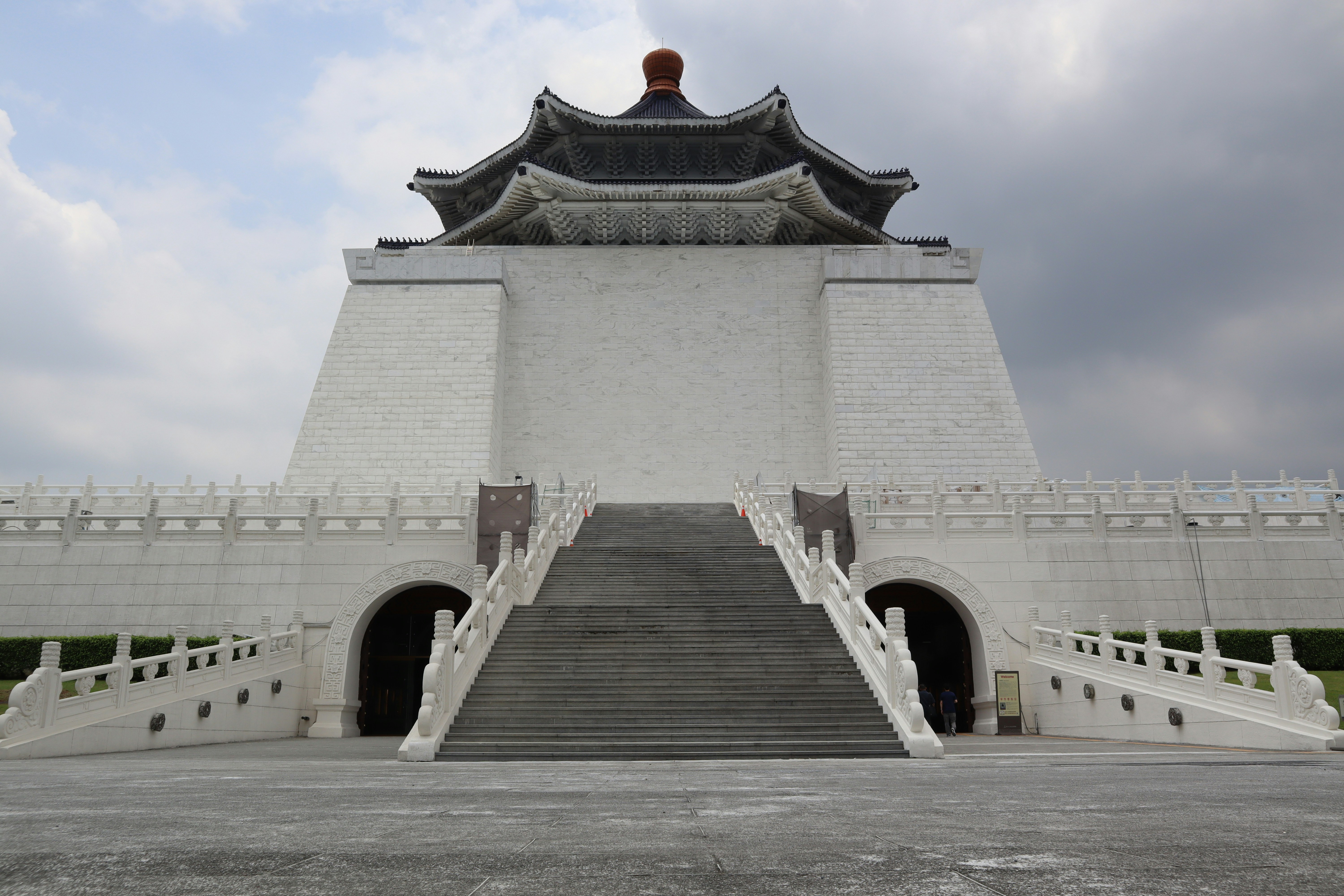 Steps to the Pagoda: A Monumental Ascent under Gray Skies