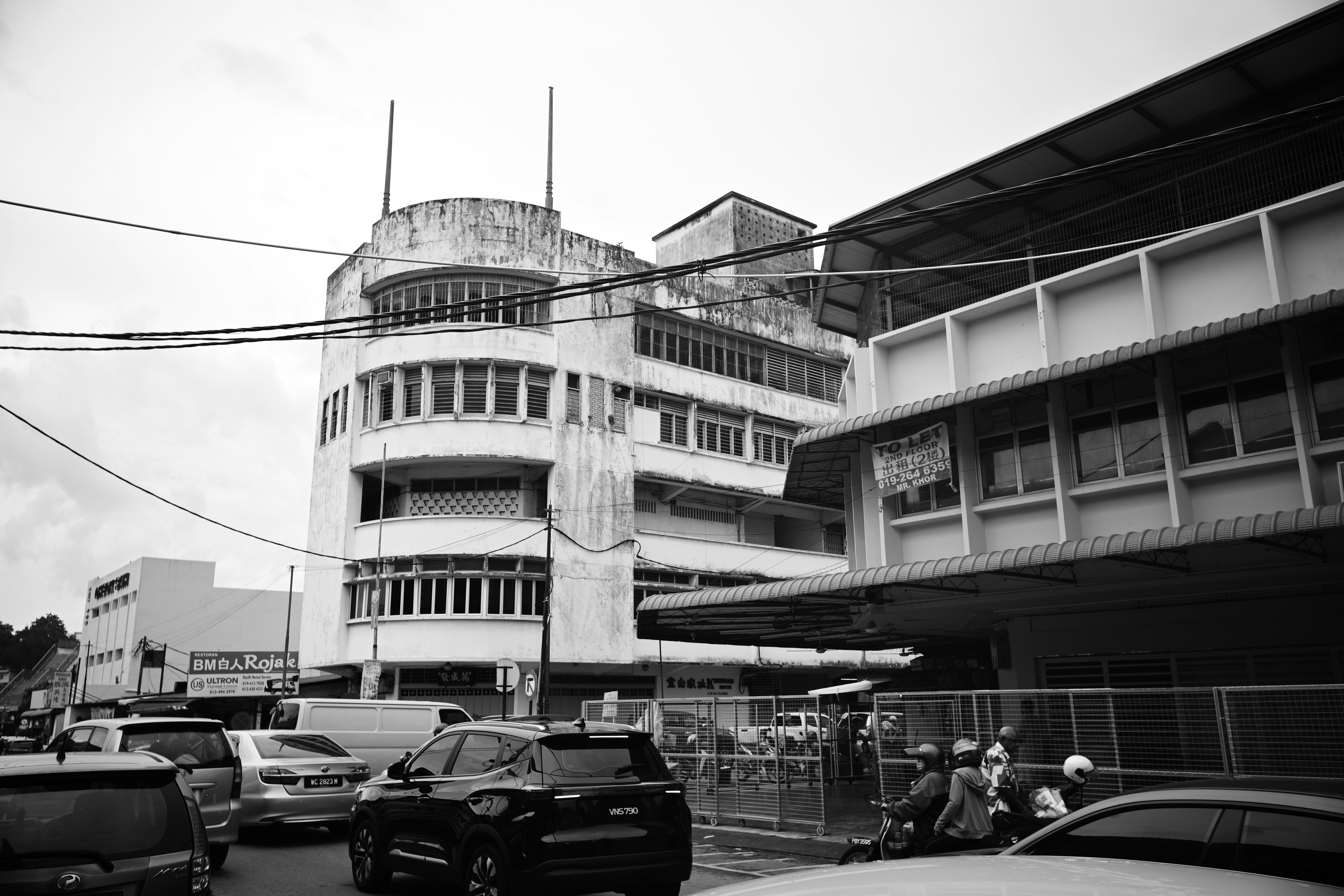 A collection of black-and-white and color street photos from Bukit Mertajam, Penang — capturing old streets, local life, urban textures, quiet corners, and everyday Malaysian moments.