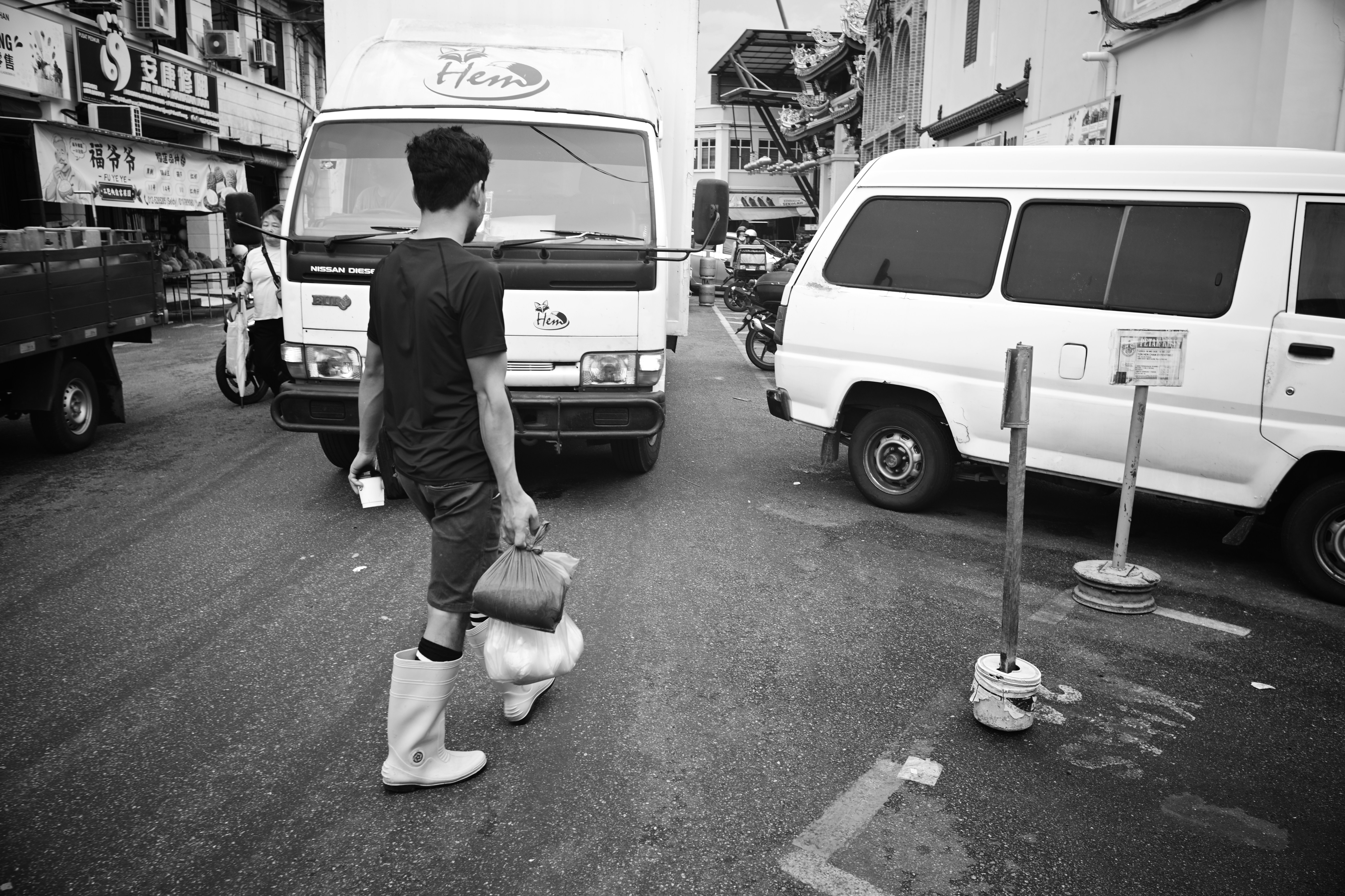 Booted Traveler in a Quiet Street Grid