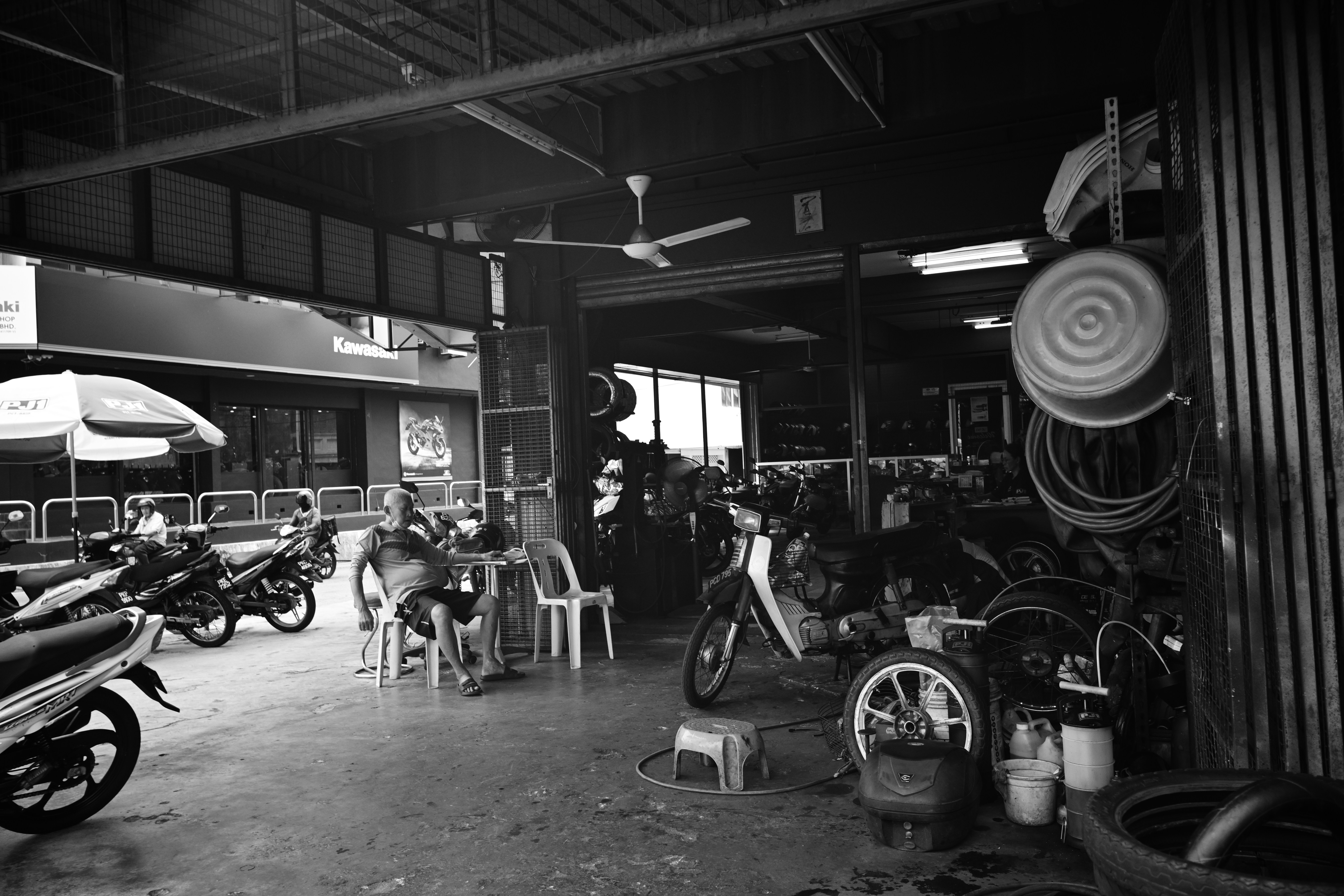A collection of black-and-white and color street photos from Bukit Mertajam, Penang — capturing old streets, local life, urban textures, quiet corners, and everyday Malaysian moments.