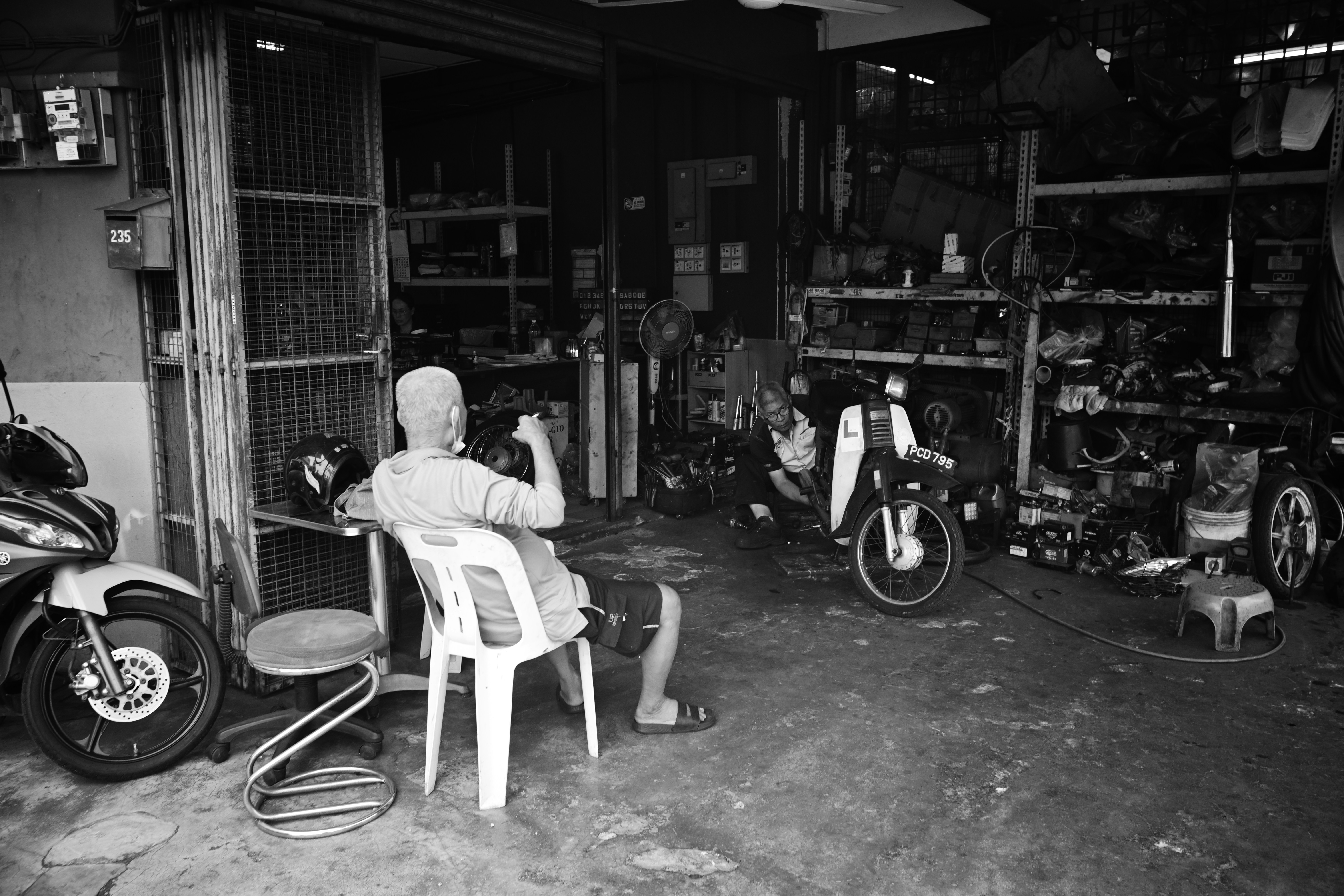 Wrench-and-Wire: A Quiet Workshop Portrait in Greyscale