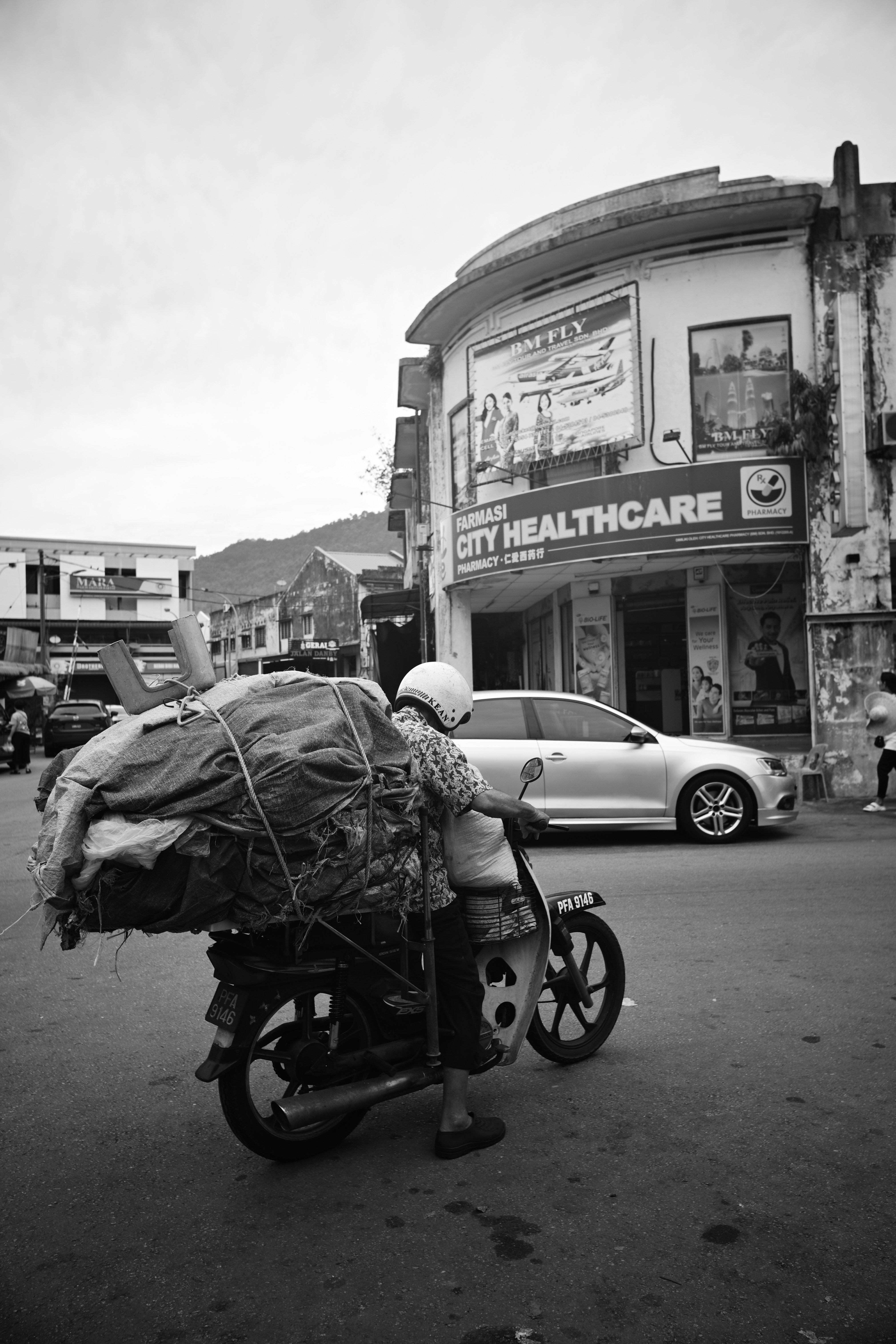 Rusted Street Contraption: A Tanker of Burden on a Quiet City Corner