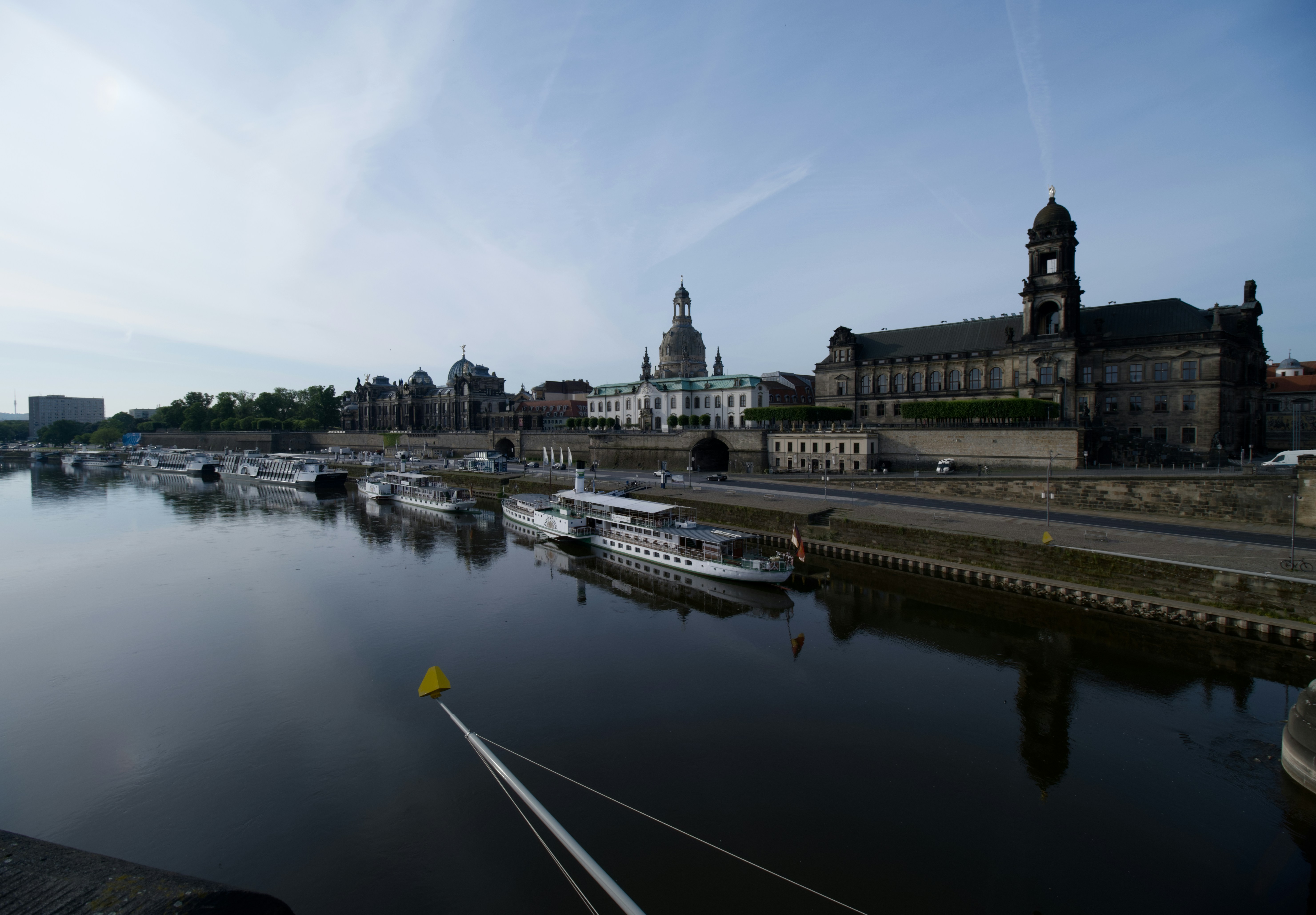 Harbor of Dresden: Slender Boats and Historic Facades Reflected