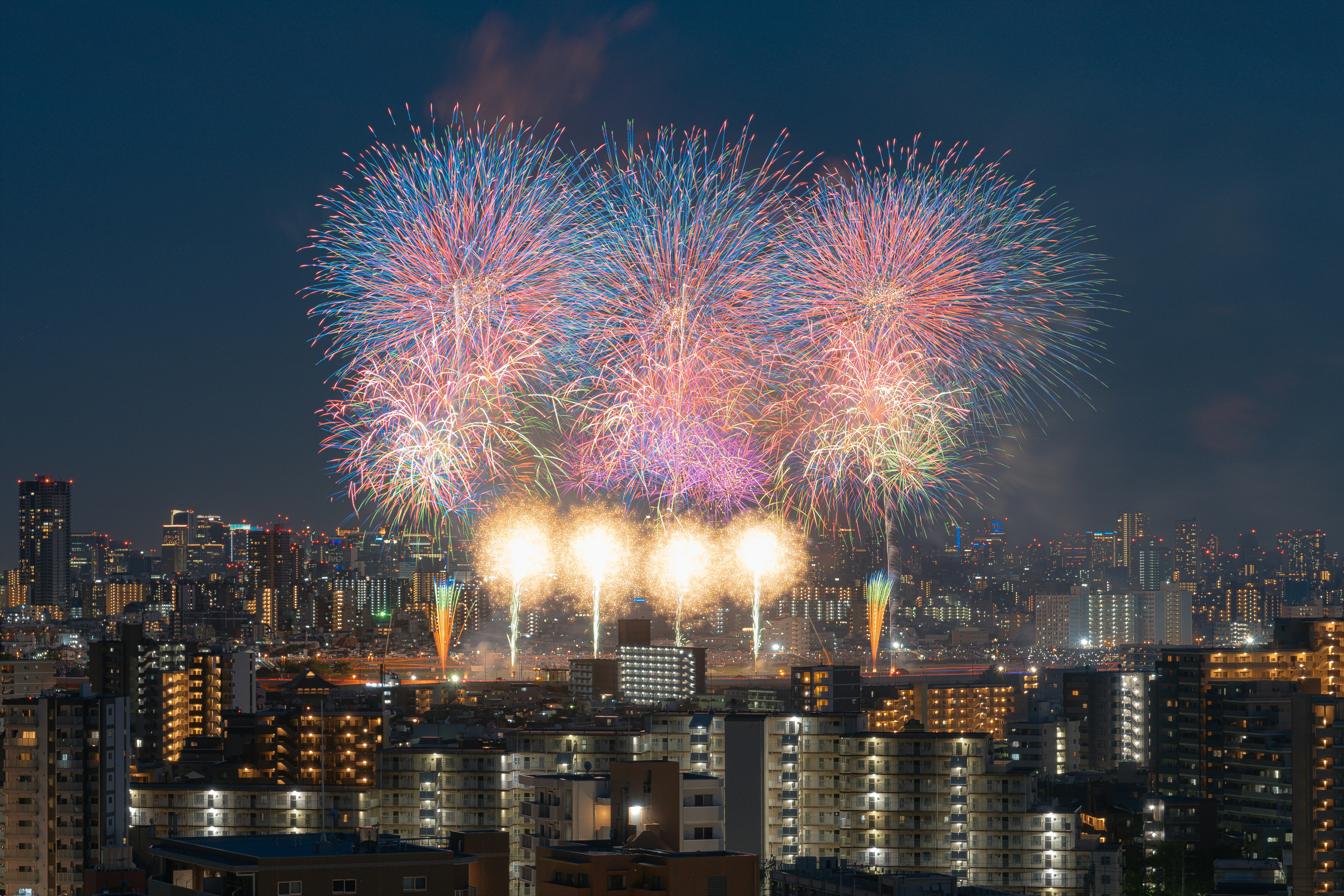 Skyborne Echoes: Night-city Fireworks Over the Quiet Horizon