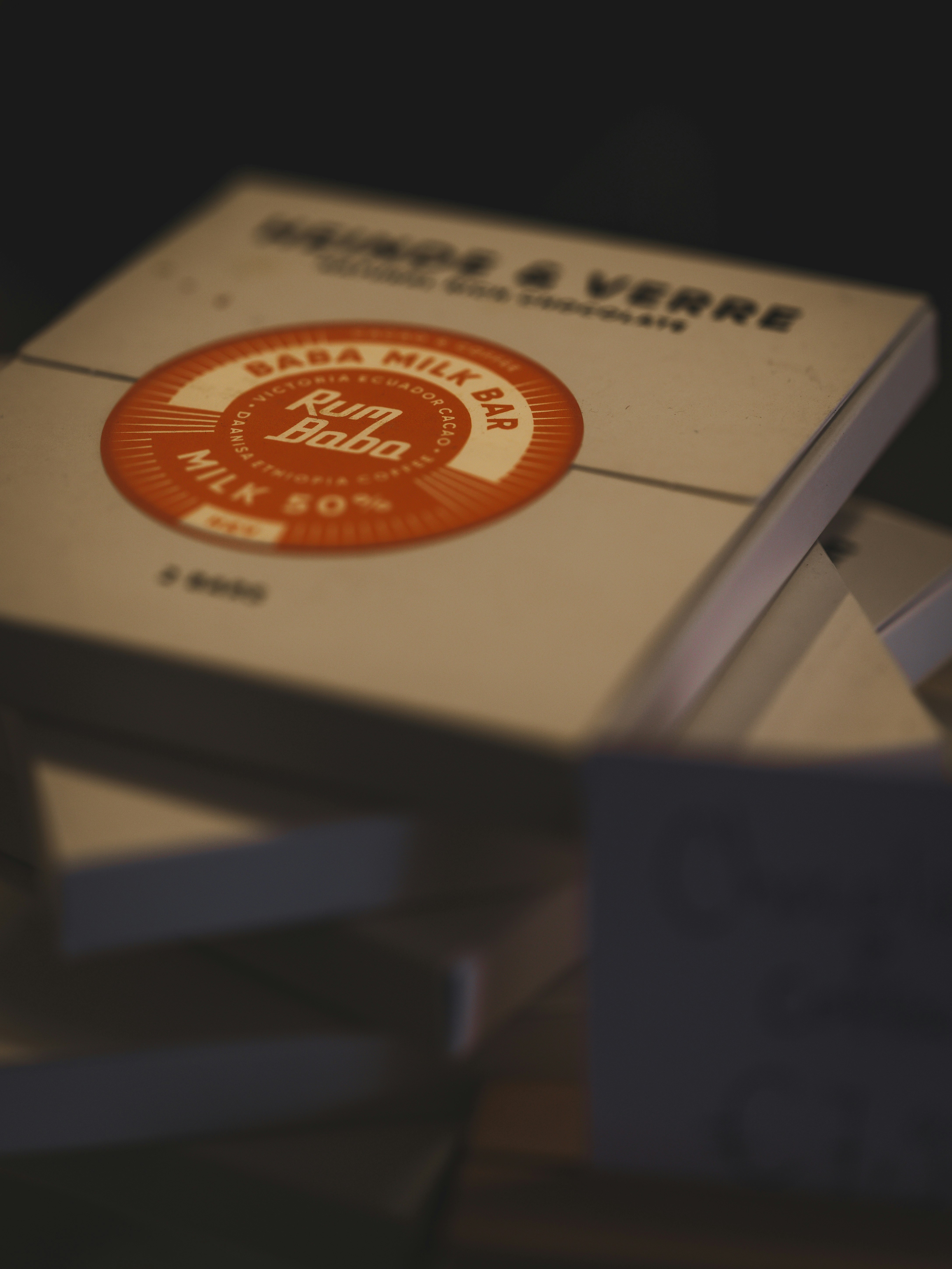 Orange Seal on a Milk Box: A Quiet Still Life