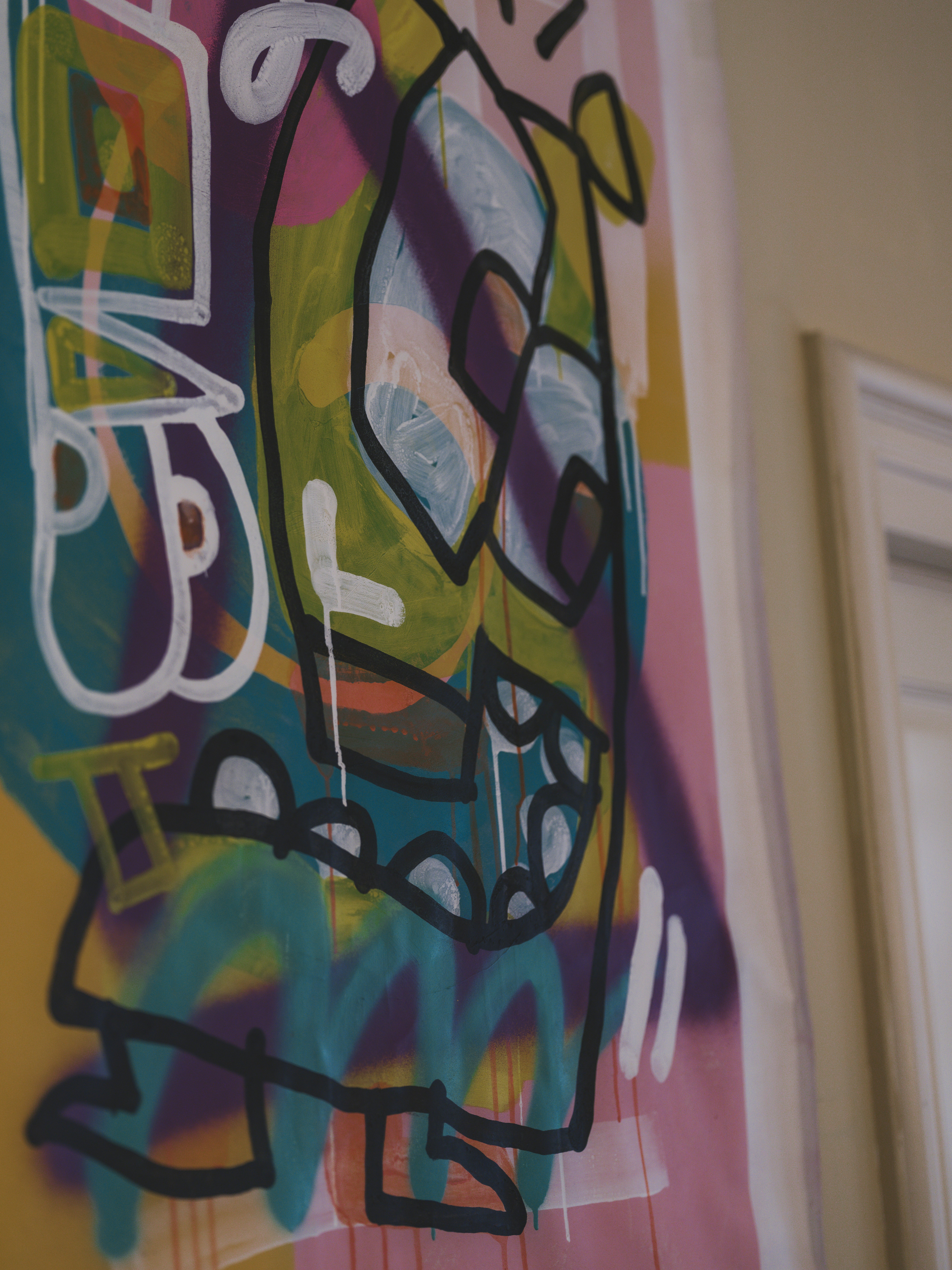 Colorful Skull Graffiti Filling a Quiet Indoor Wall