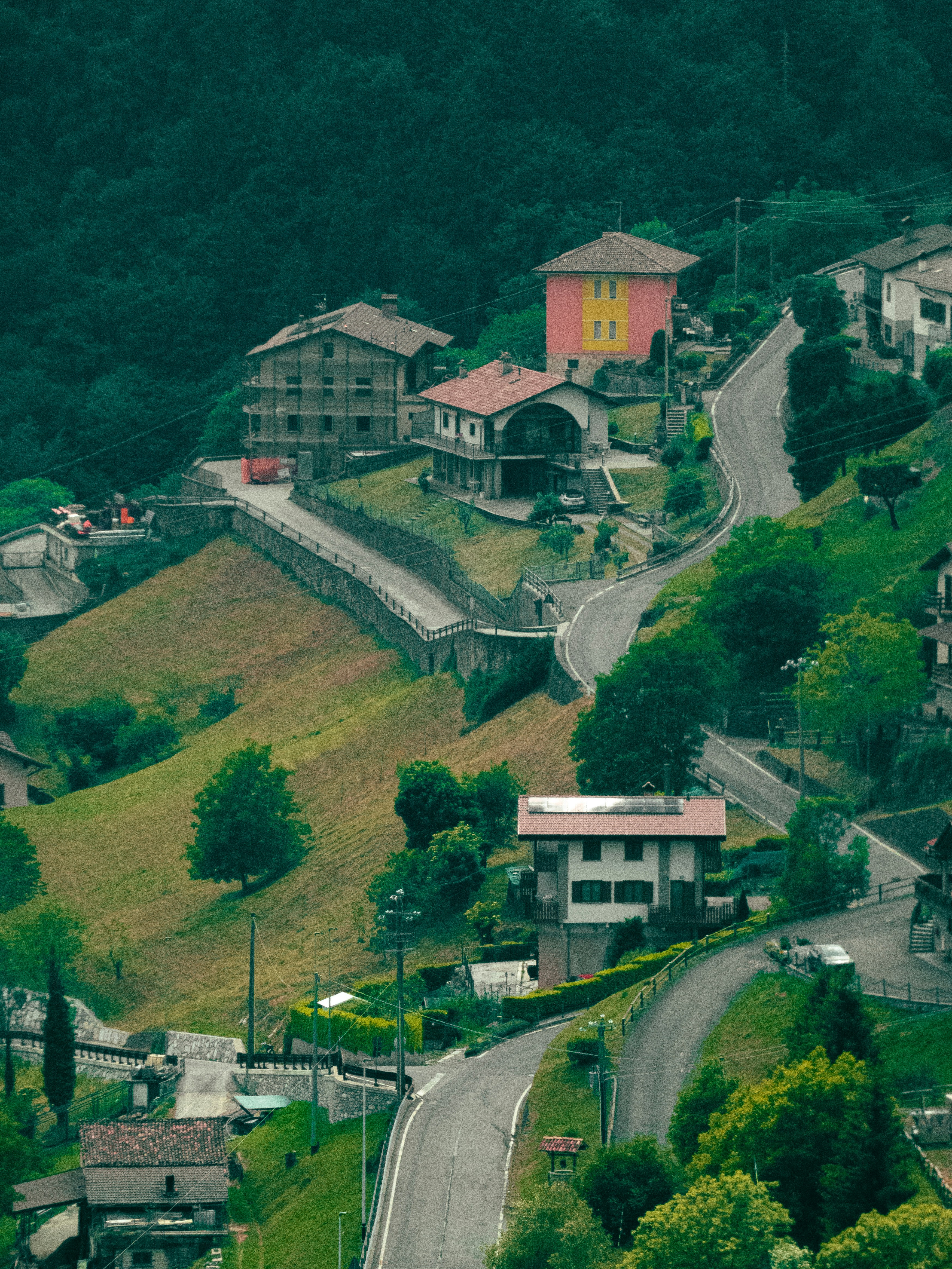 Pastel House on the Winding Hillside