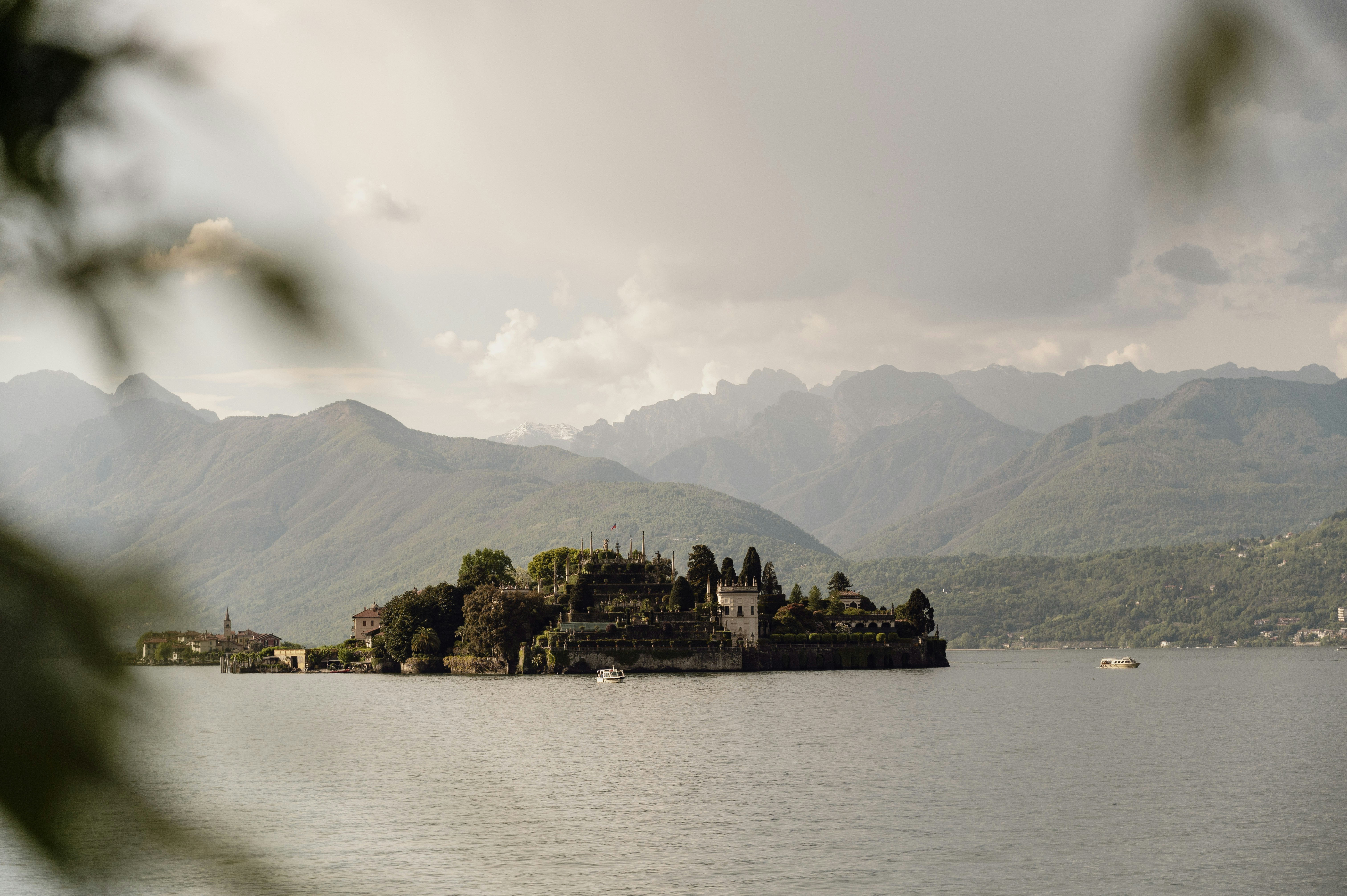 Temple Island Emerges from Mist: A Quiet Mooring in Lake Como