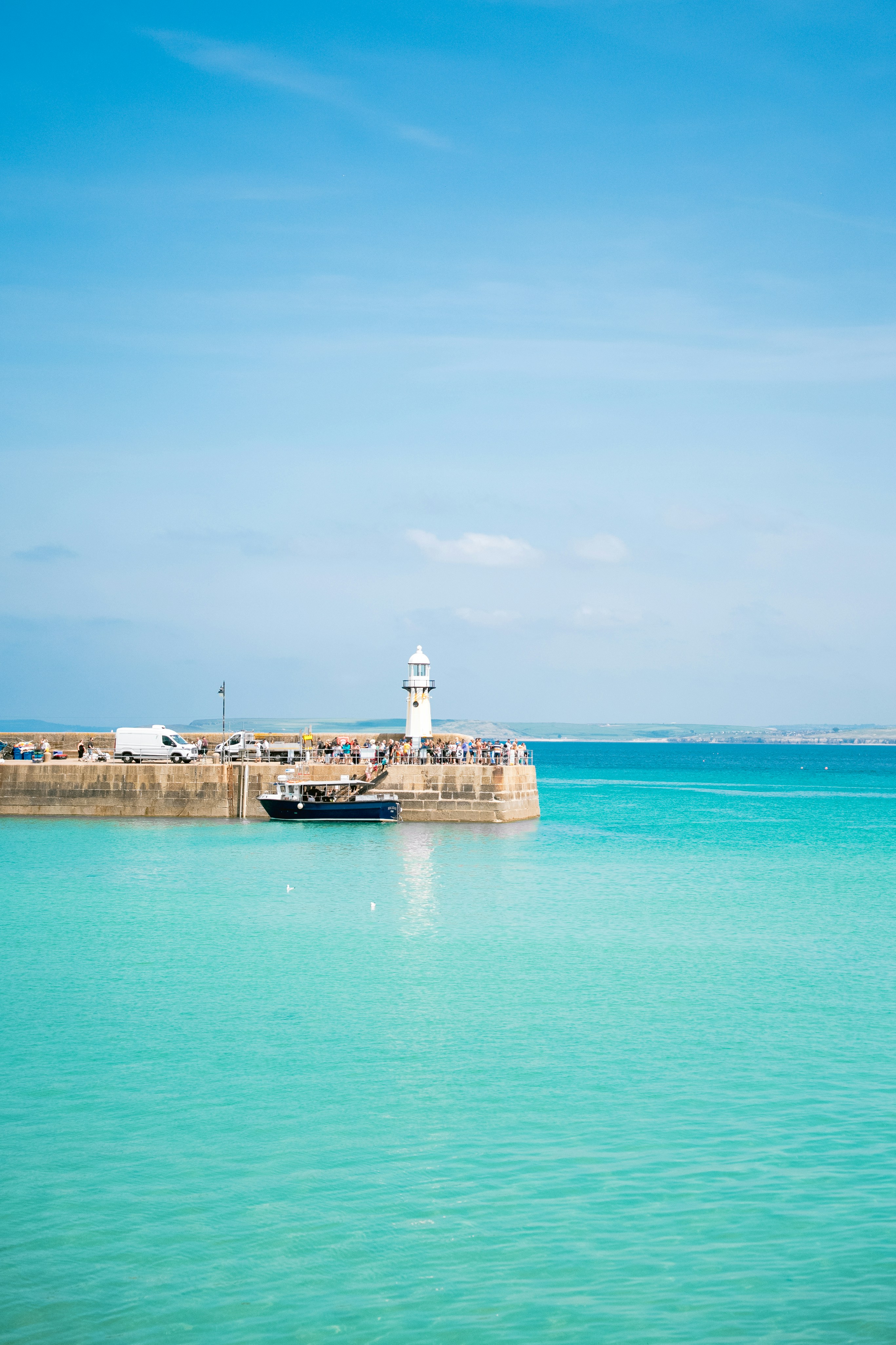Azure Breakwater: A Morning at the Lighthouse