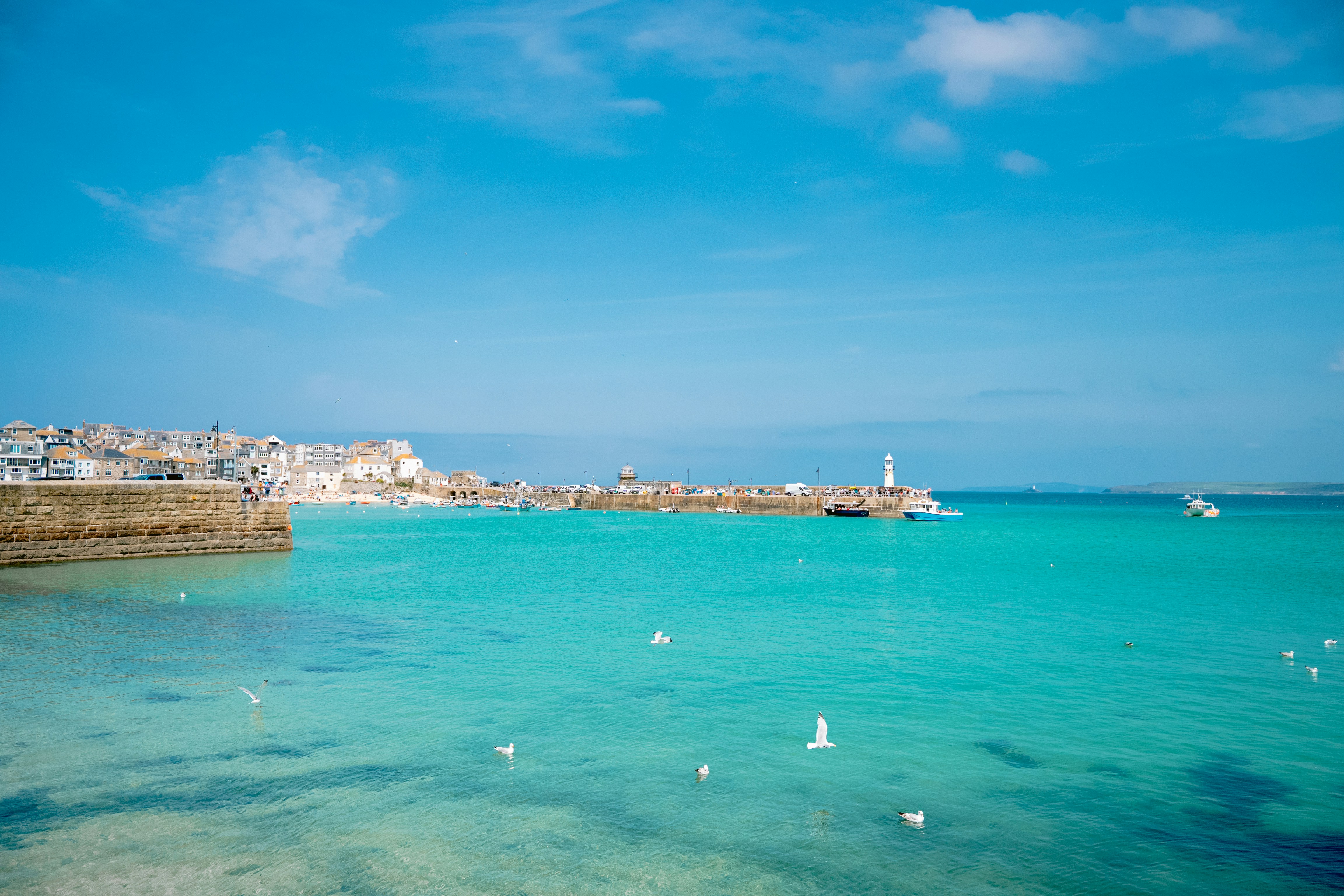 Turquoise Cove and Harbor: Sunlit Town by the Sea