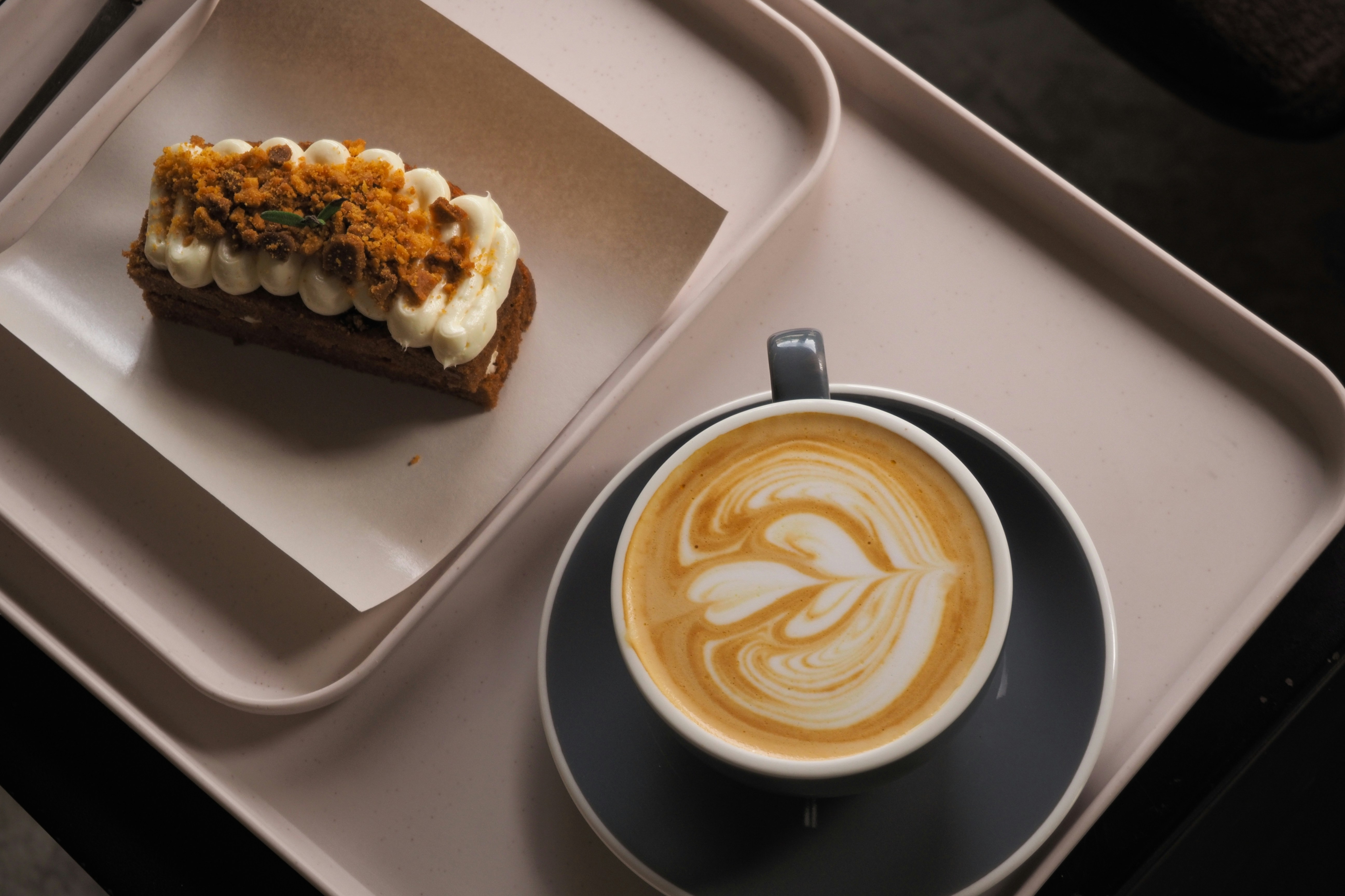 A Quiet Break: Pastry and Latte on a Tidy Tray