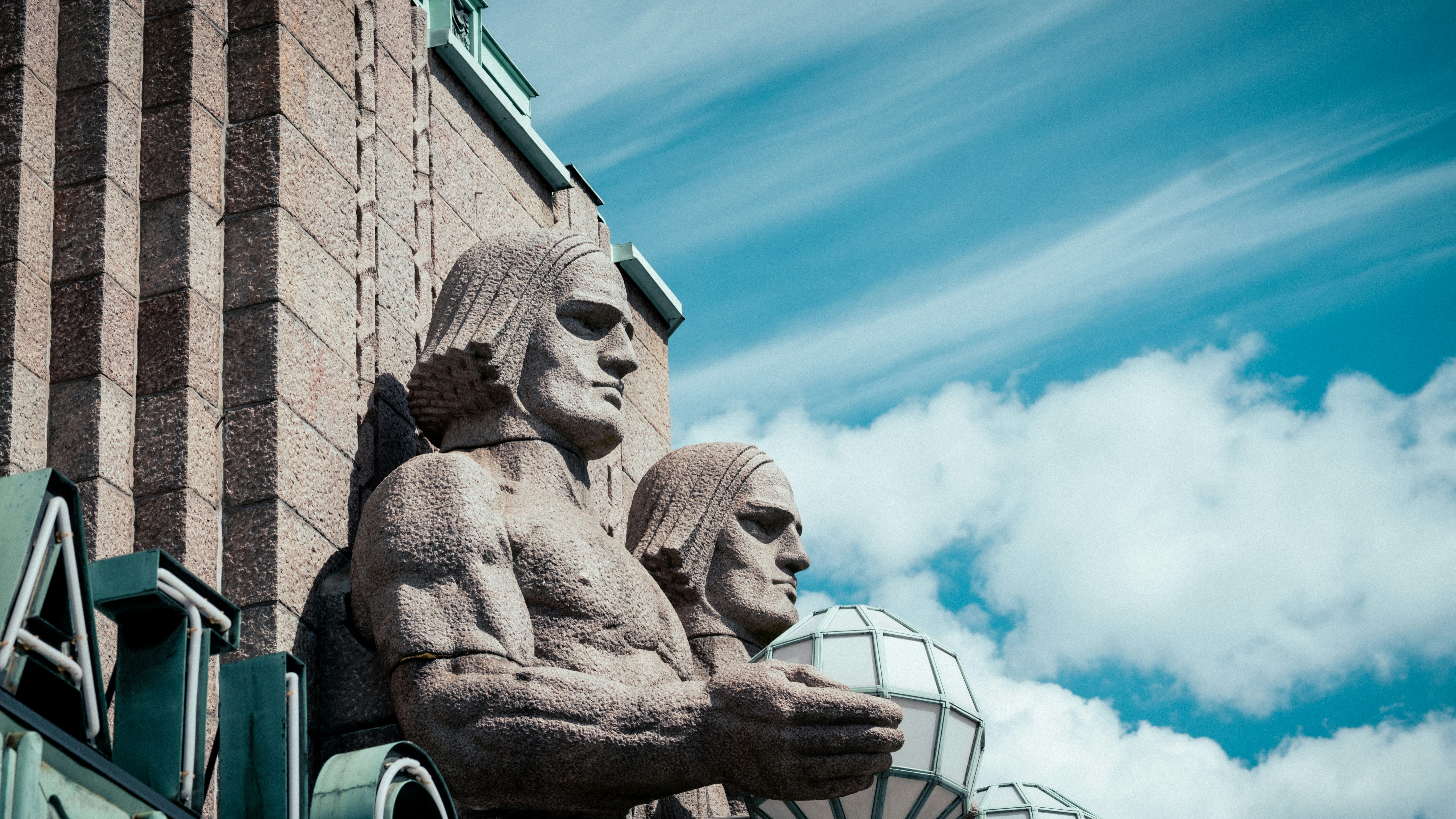 Granite Guardians: A Pair of Sculpted Sentinels Overlooking the City