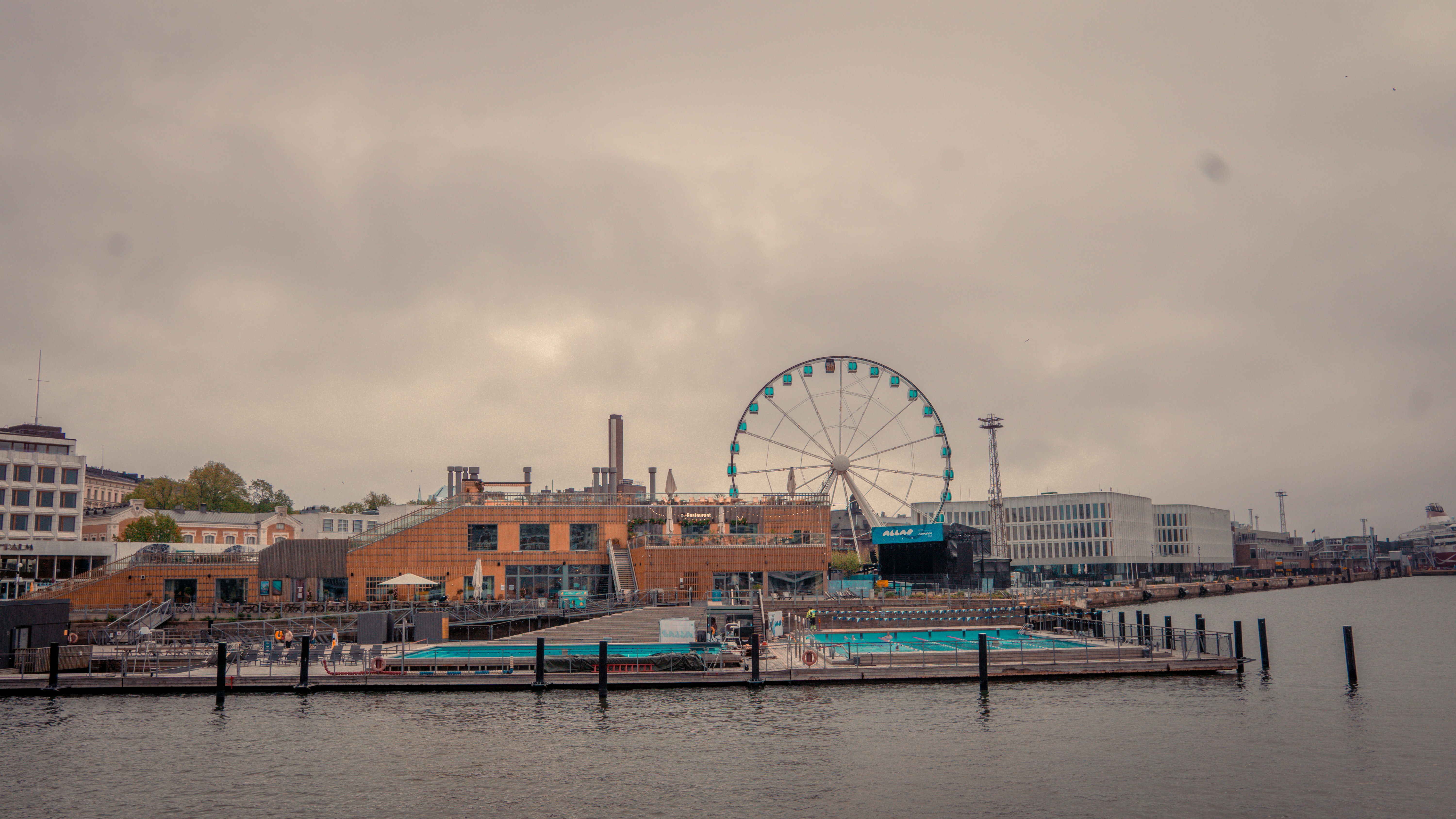 Ferris Wheel Overlooking Pier: Harbor Calm at Dusk