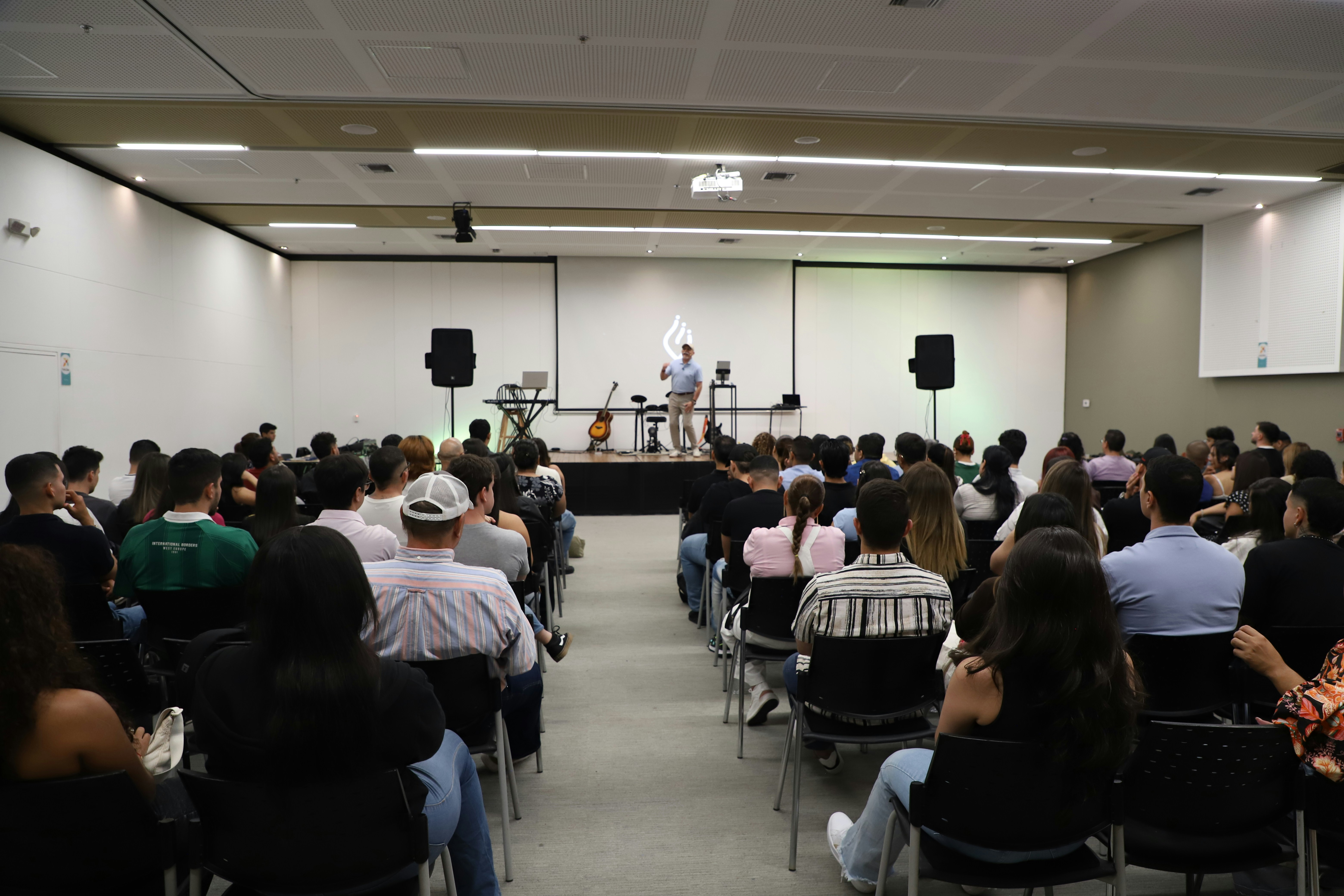 Center Stage: Speaker at a Seminar Draws the Crowd