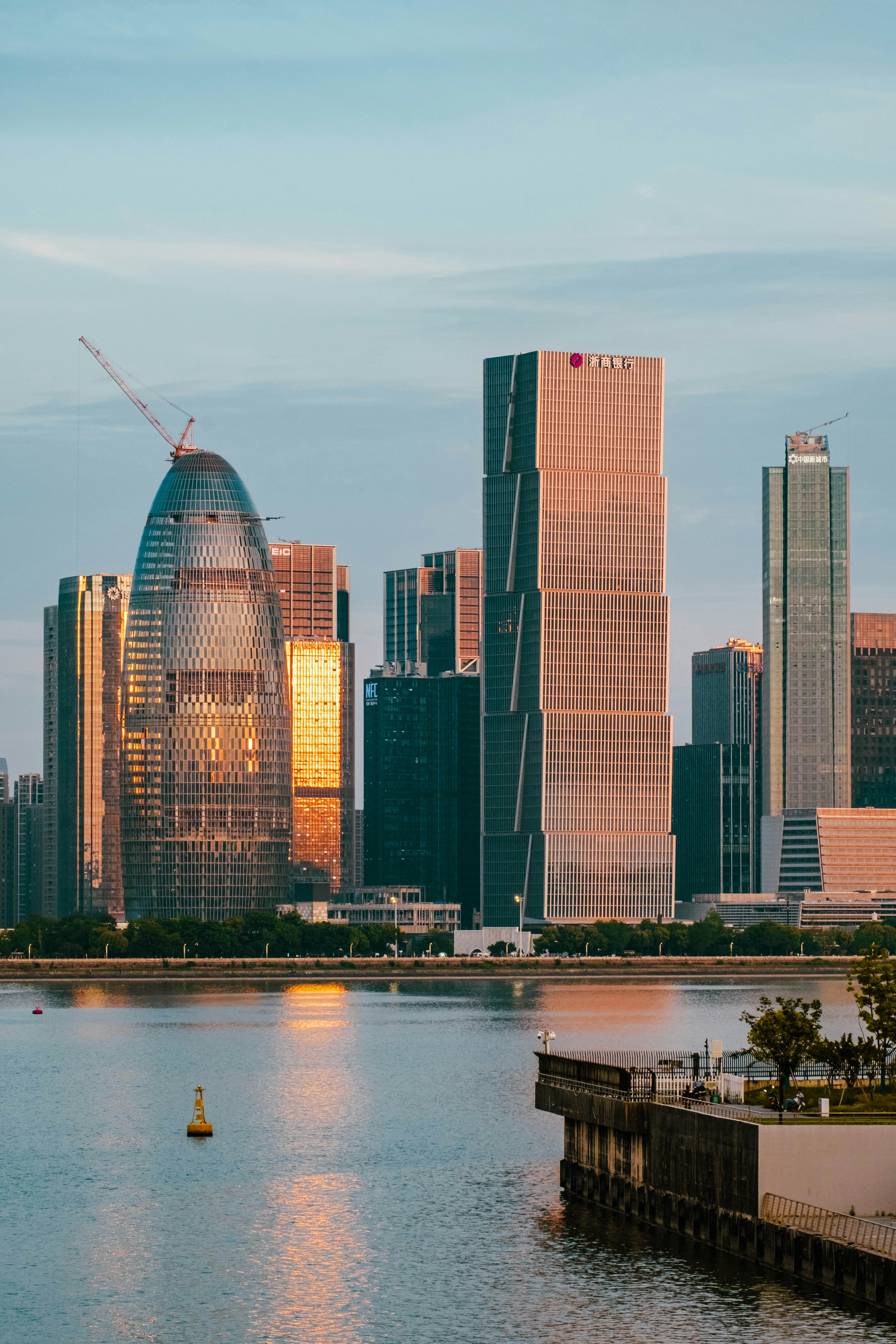 Sunset Over Canary City: A Riverside Skyline