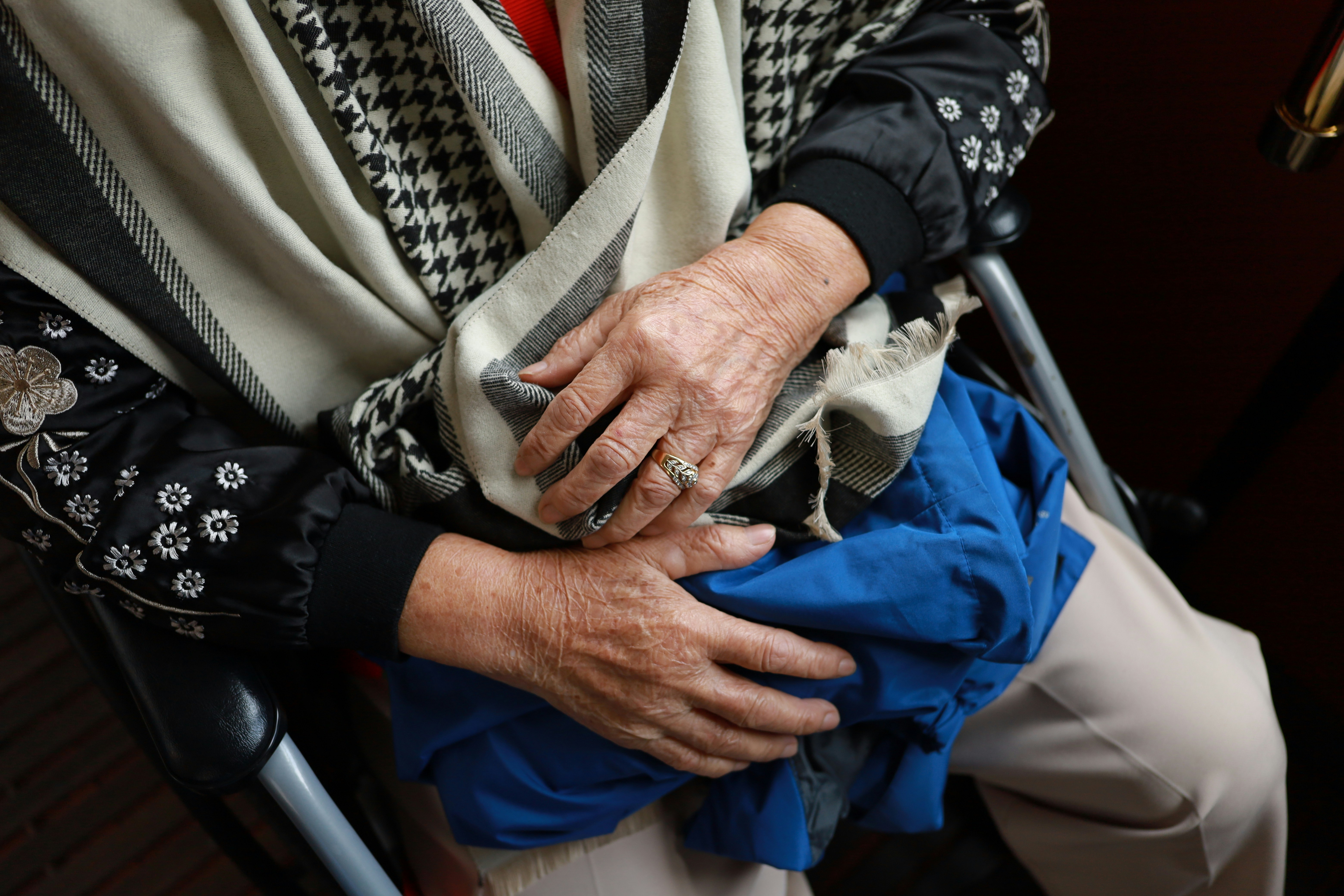 Hands in Quiet Care: A Elderly Moment of Comfort