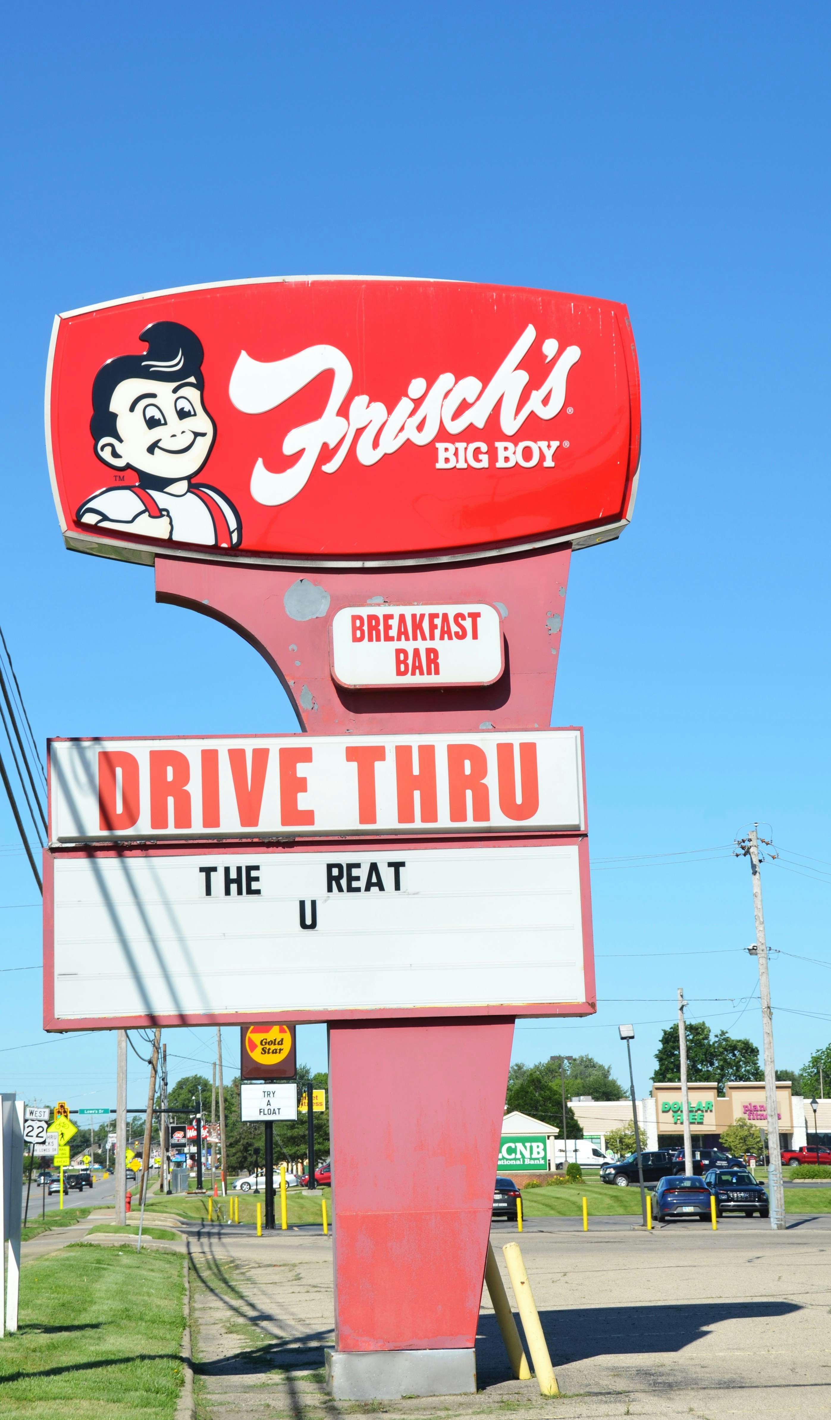 Frisch’s Drive-Thru Sign: Retro Neon and Red Curve Under a Clear Sky