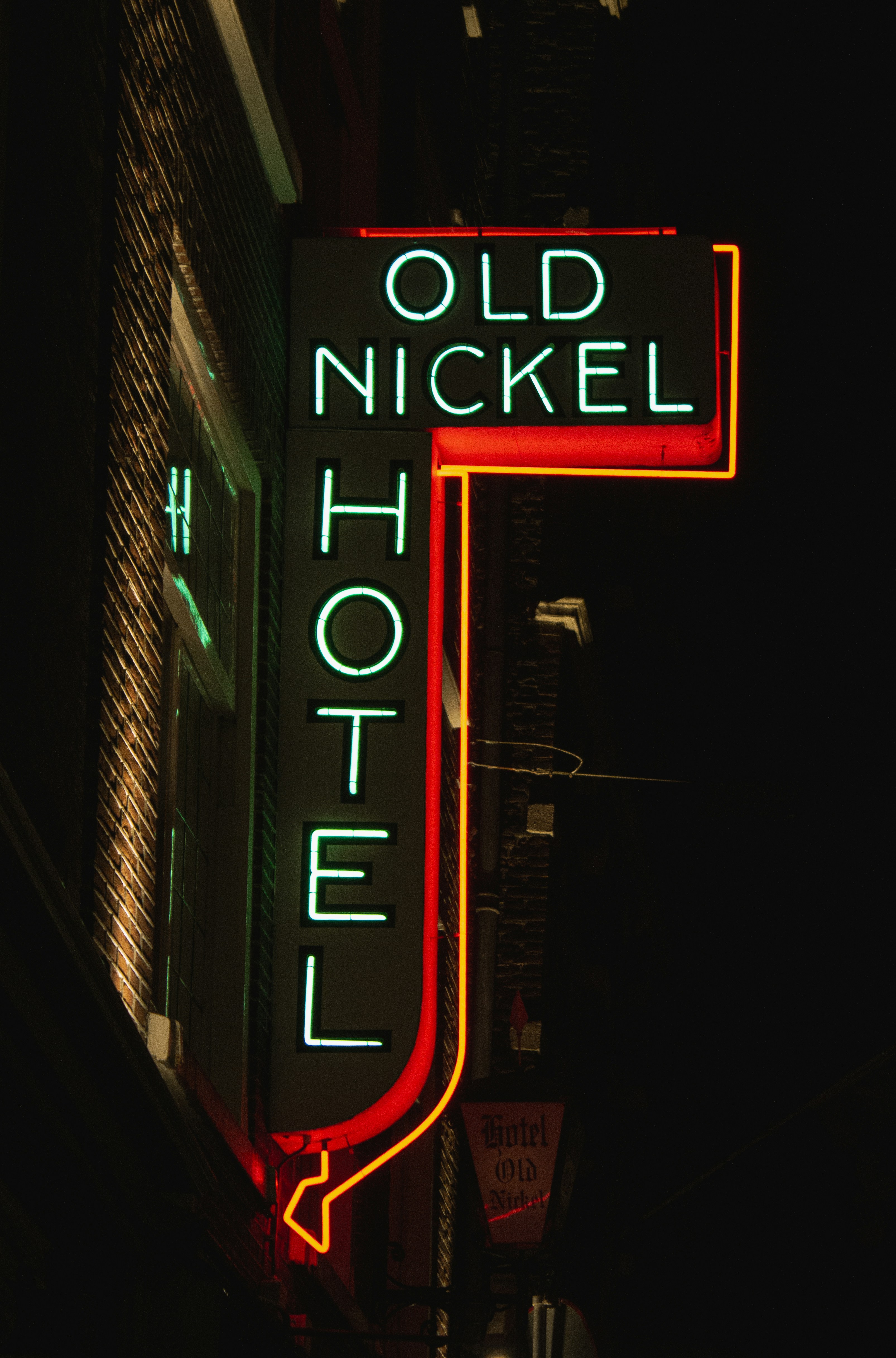 Neon Signage: Old Nickel Hotel Streaks of Red and Green