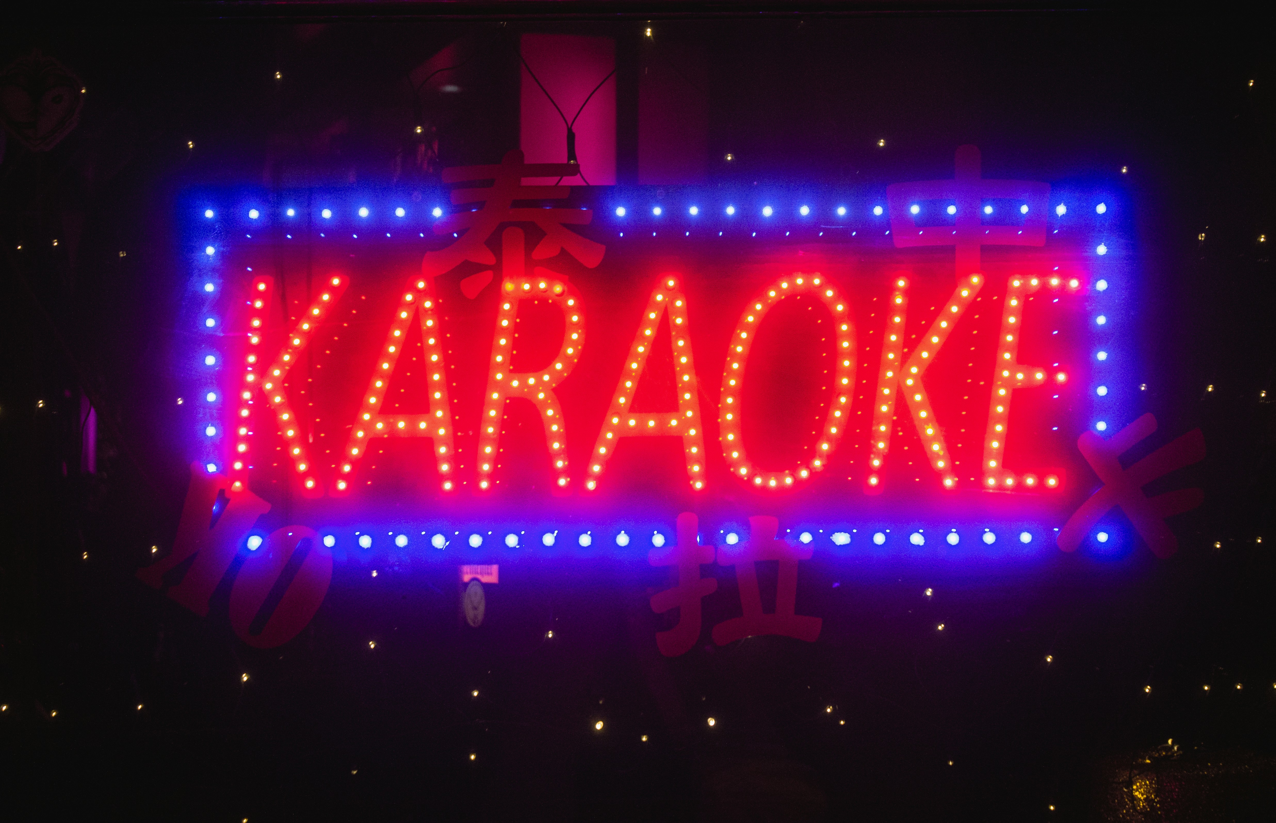 Neon Karaoke Sign Casting a Festive Glow