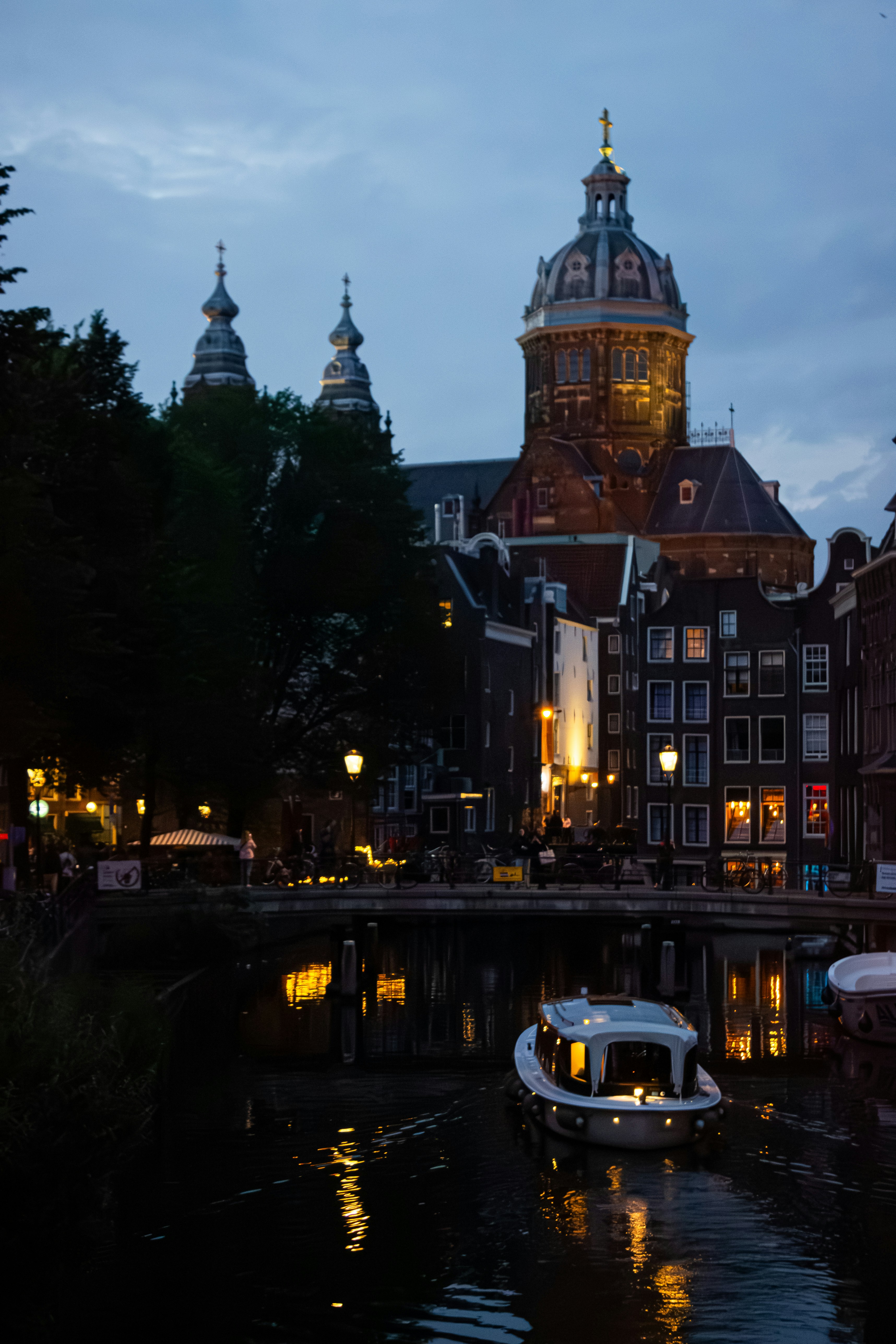 Evening Carousel of Lights along a Dutch Canal