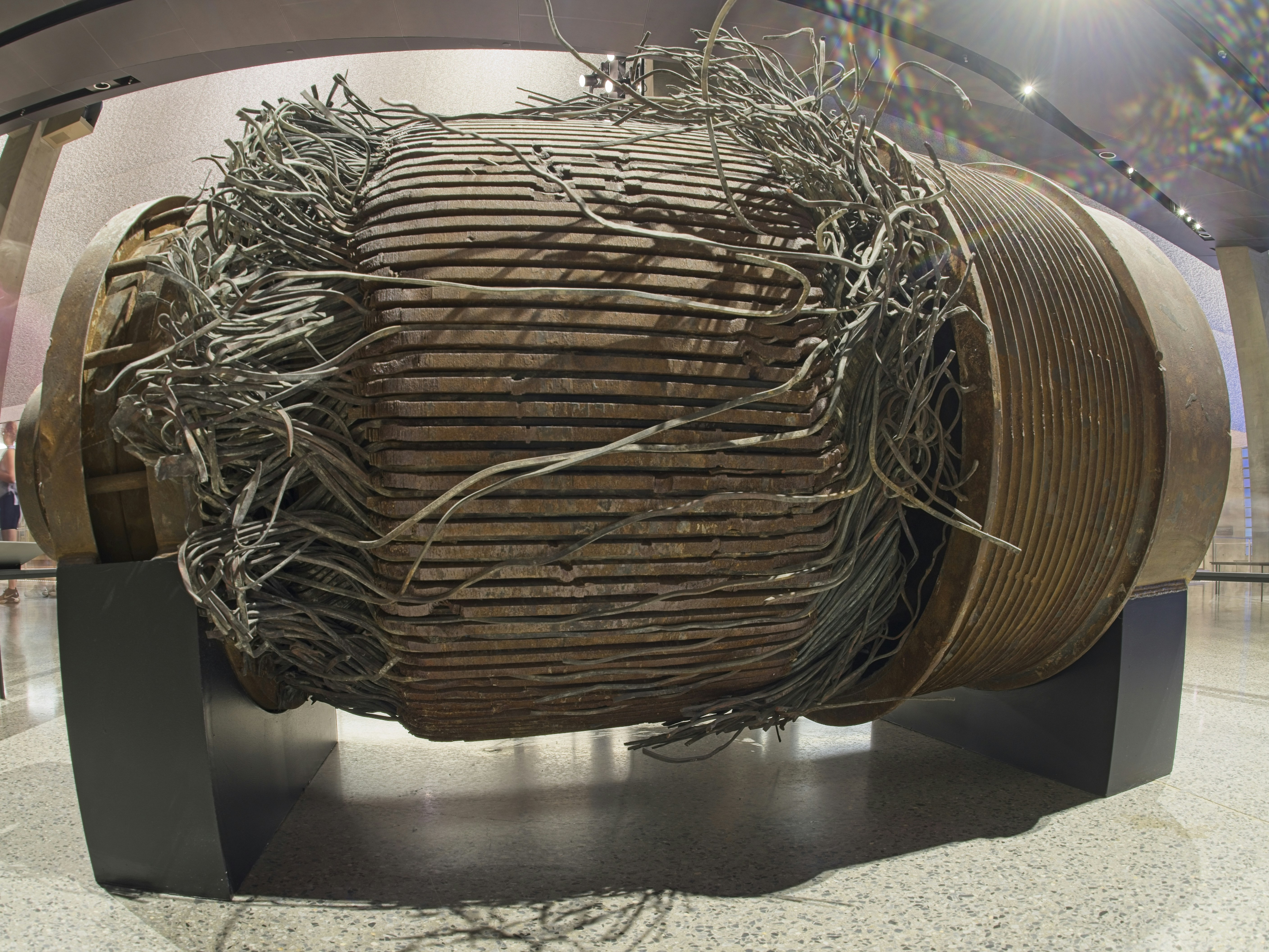Industrial Dynamo: A Wound Copper Core Strung with Metal Fibers