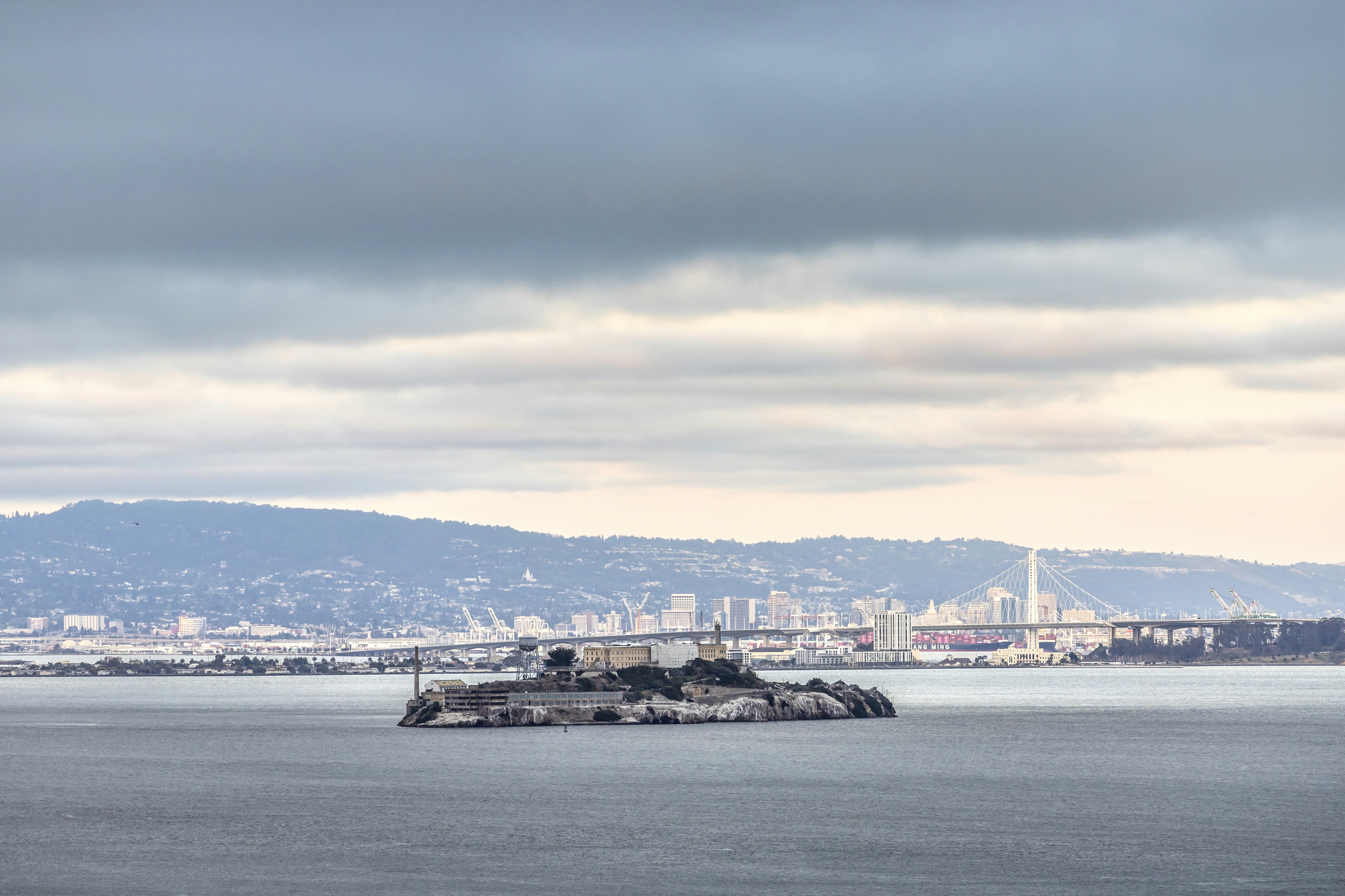 City in the Distance: An Island Float Under Layered Clouds