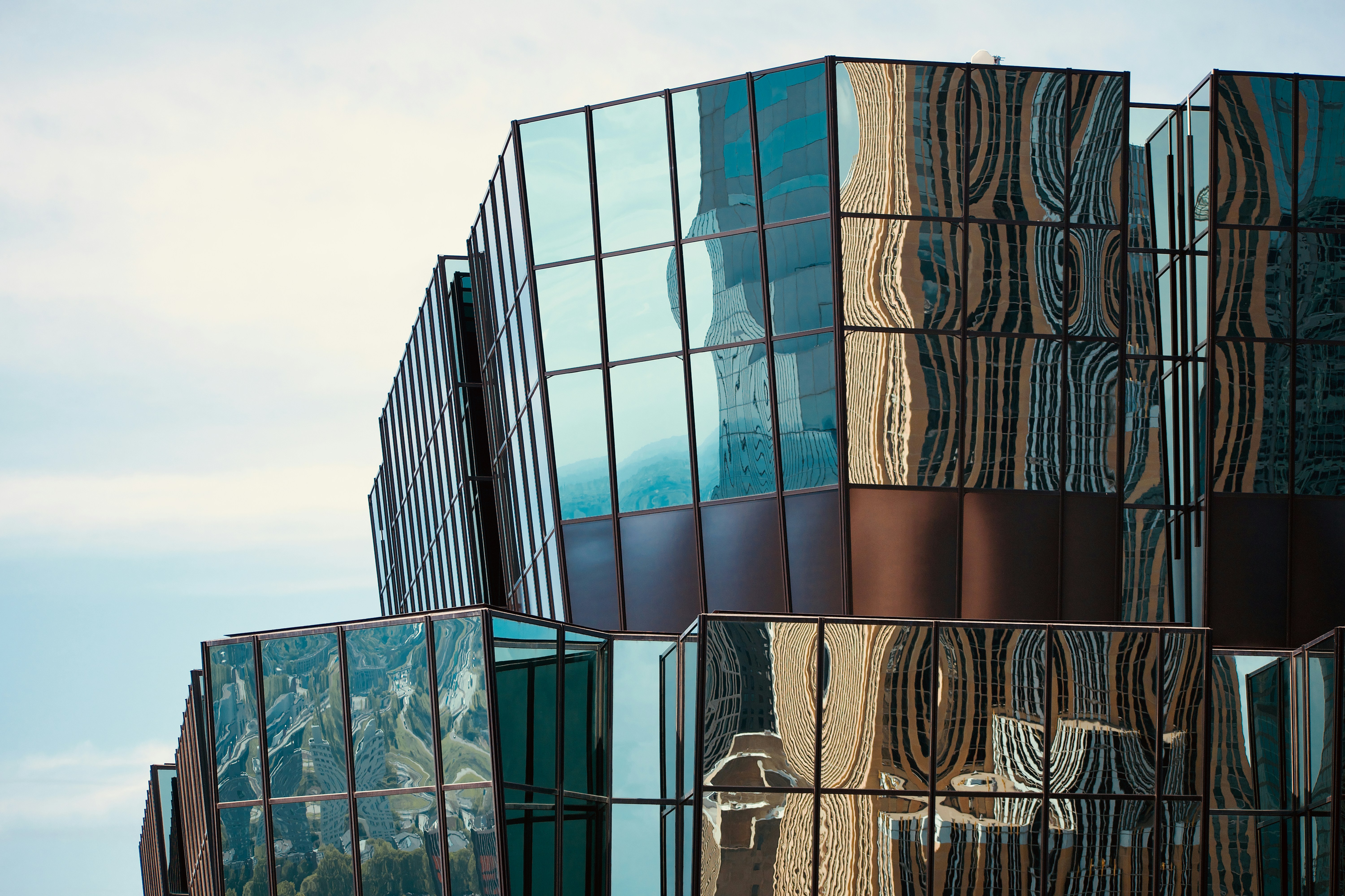 Prismatic Facade: Reflections on Geometric Glass