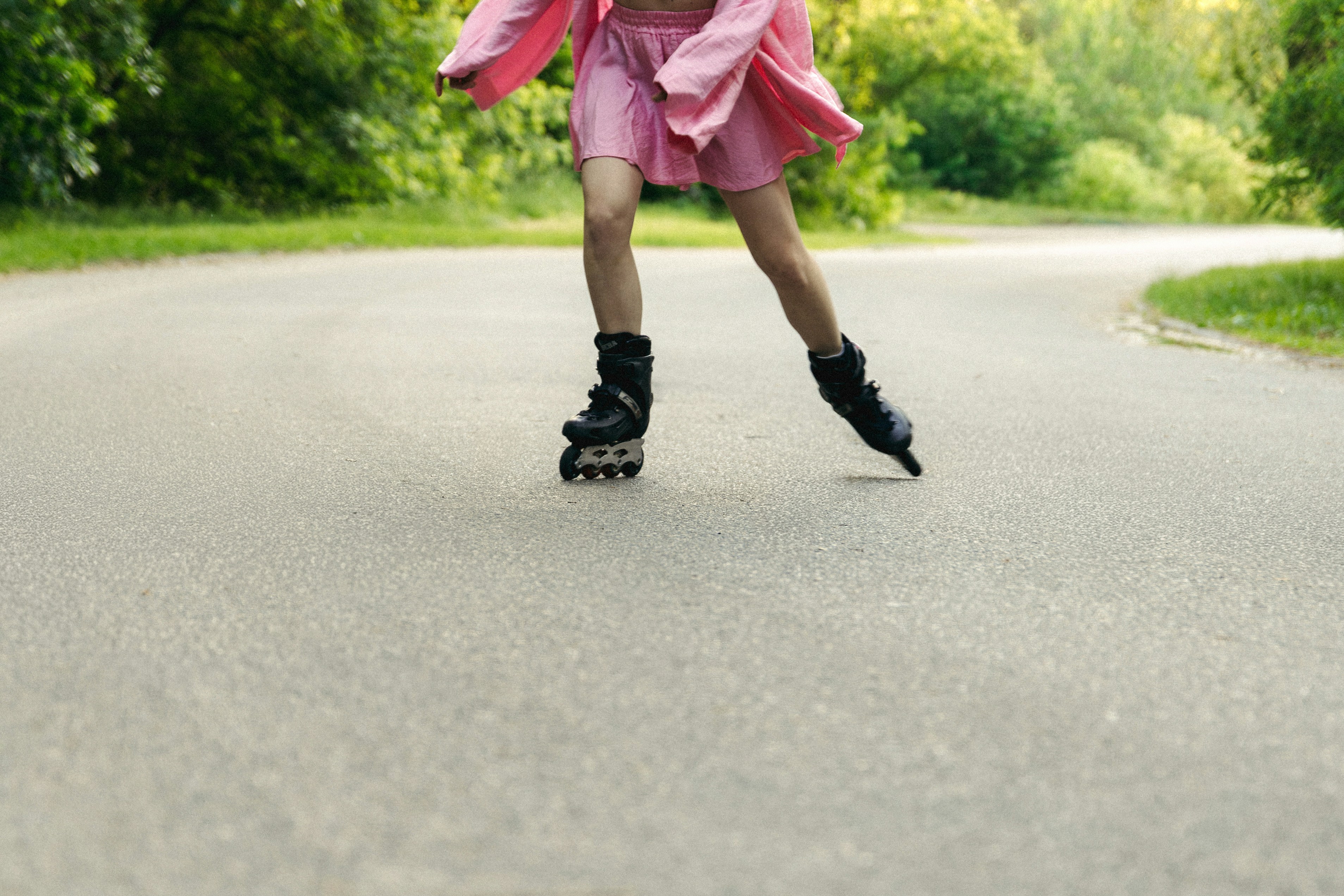 Skating in Progress: A Sunny Lunge Across the Road