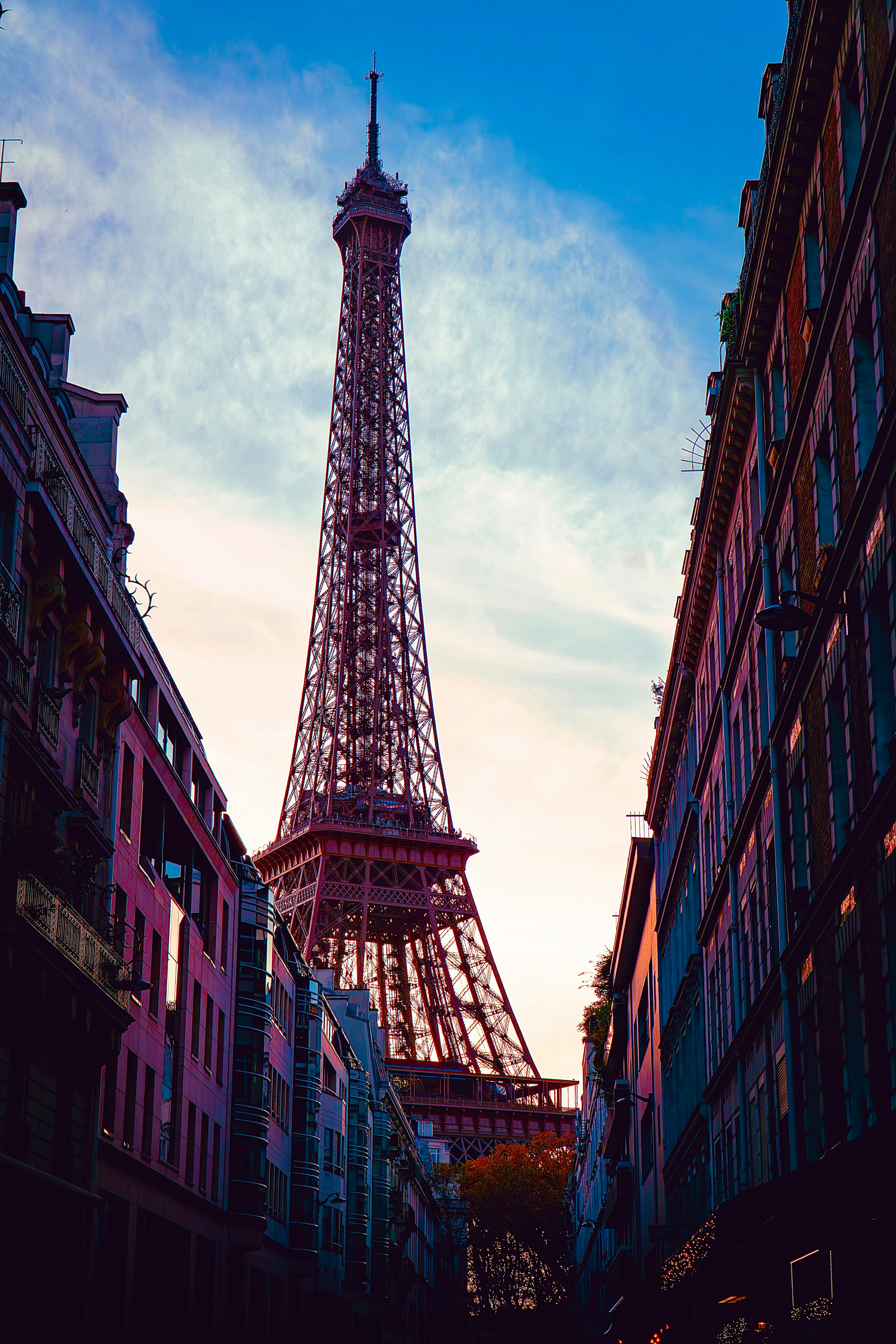 Eiffel Tower Via a Parisian Canal: Narrow Street, Grand Lattice