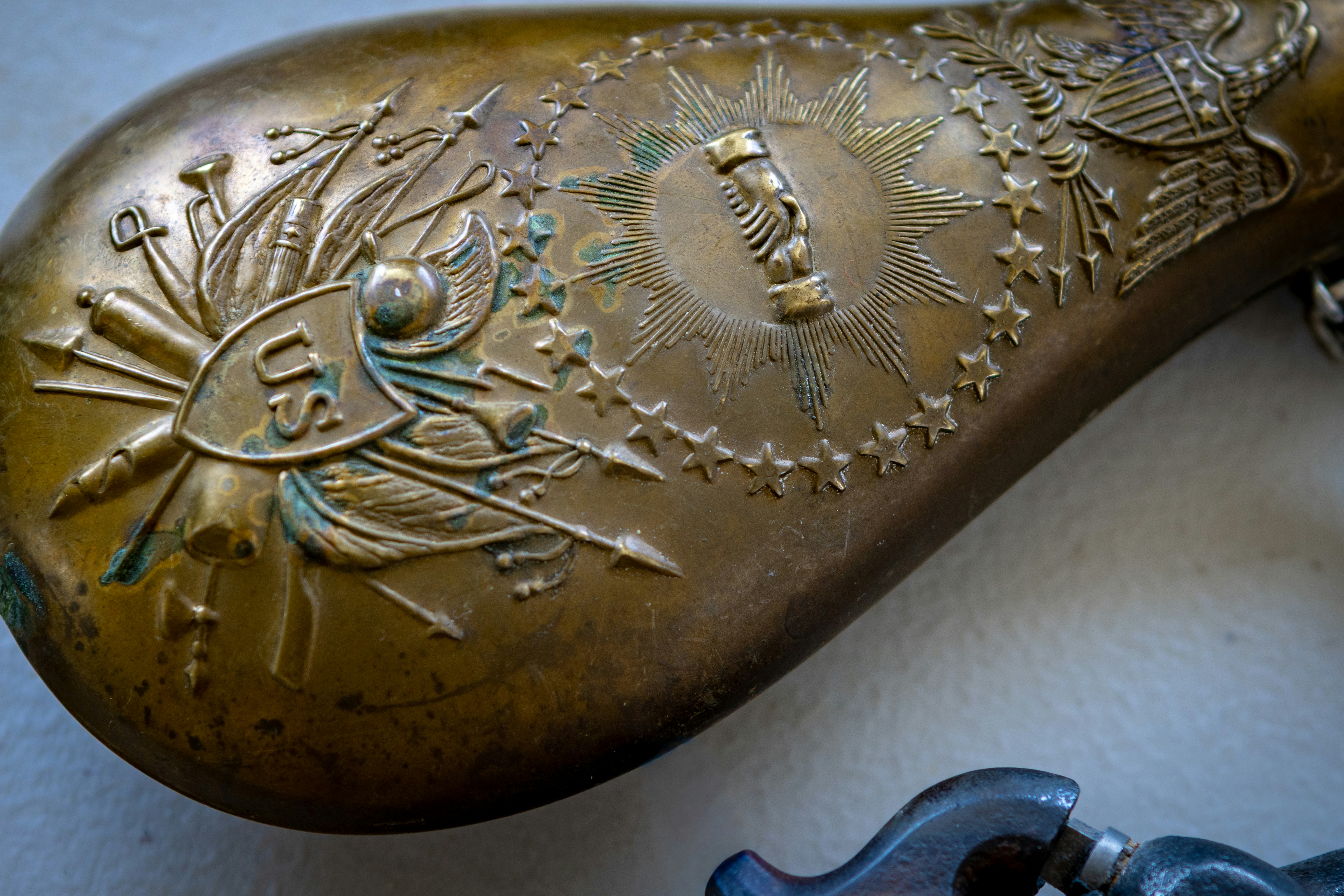 Ornate Brass Inlay on a Curved Instrument Case