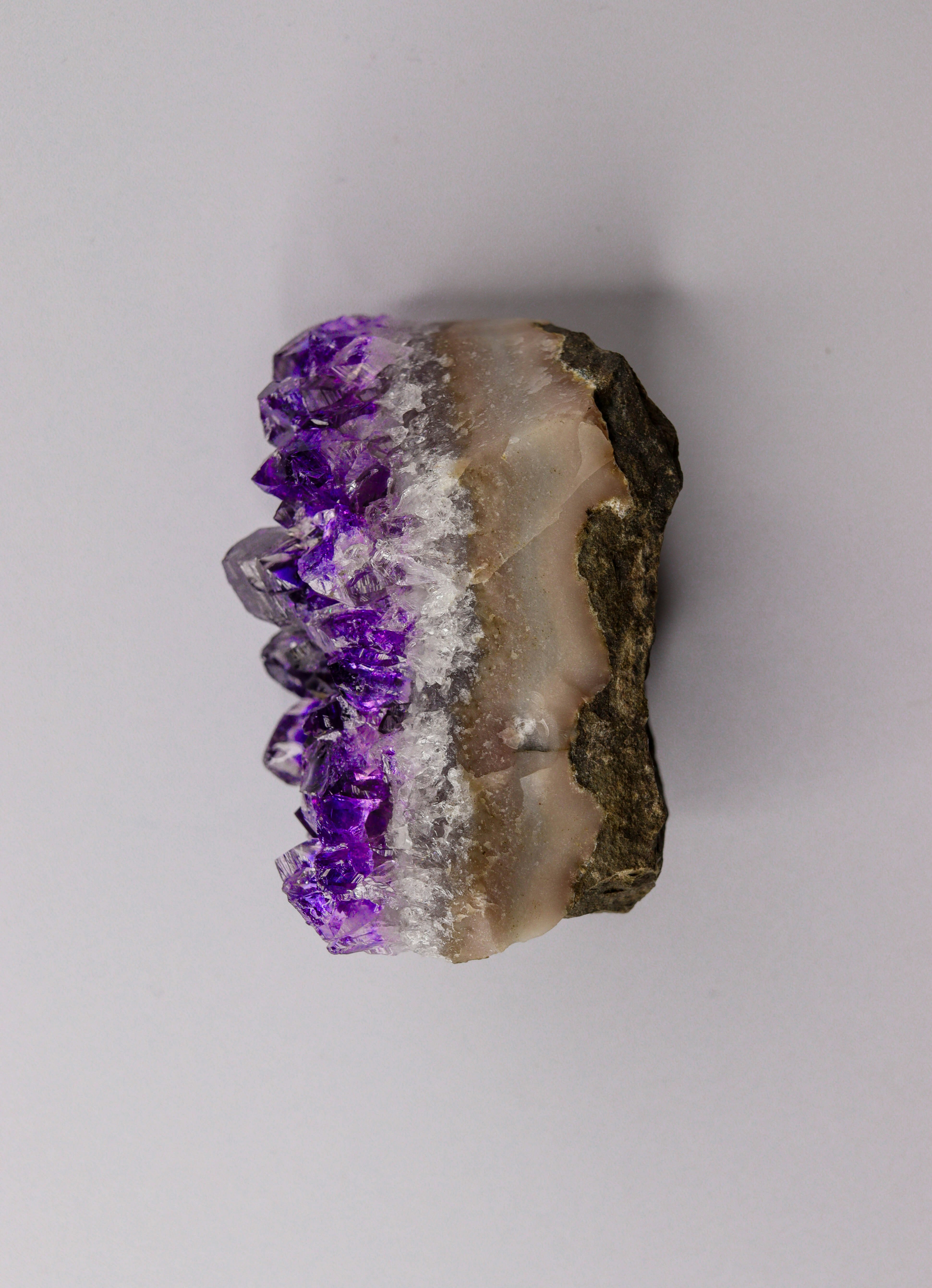 Amethyst Crystals Adhered to a Mineral Base