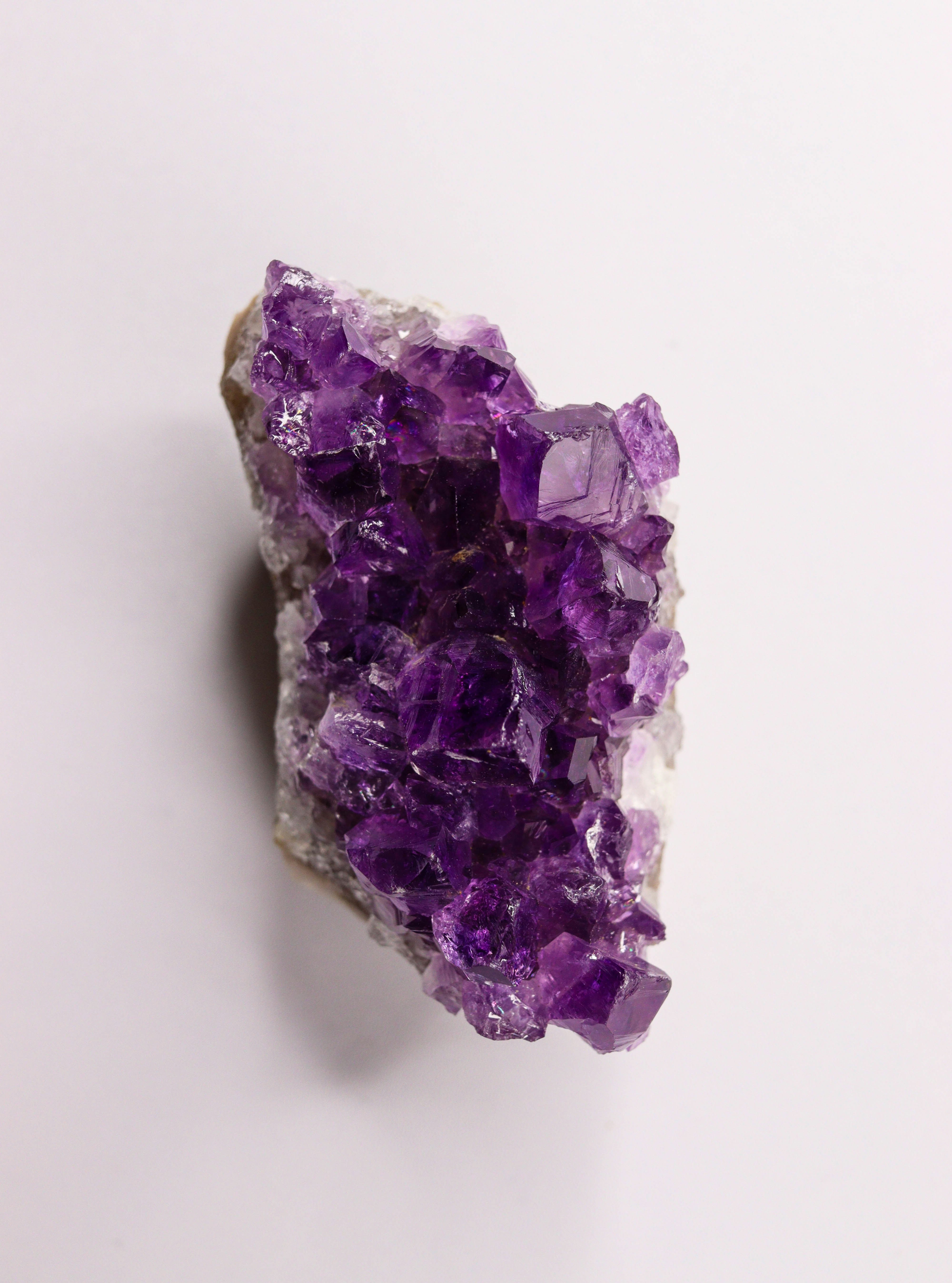 Emerald-Depth Amethyst Cluster on White