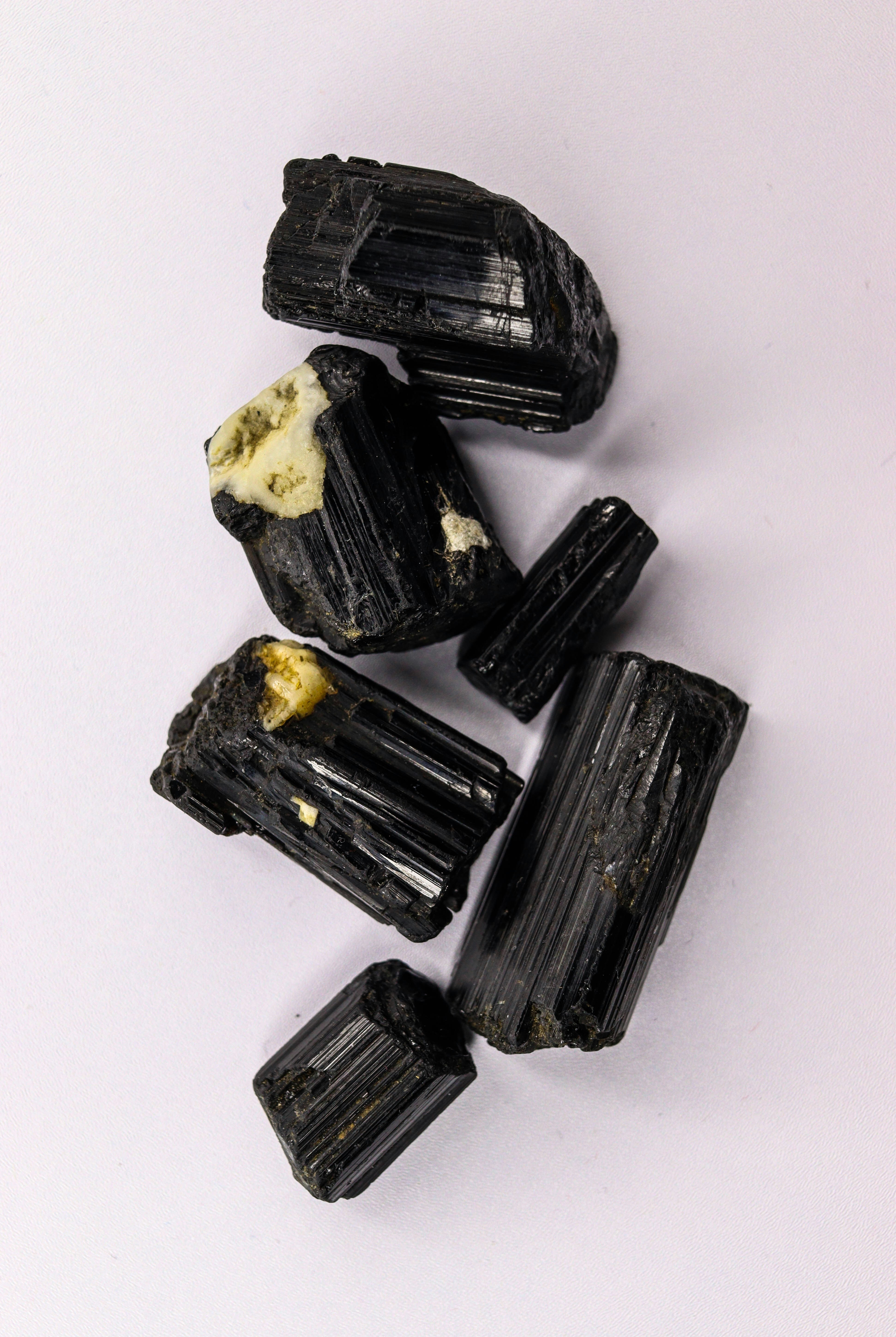 Charcoal Luster: A Tiny Assembly of Prismatic Black Tourmaline-like Crystals