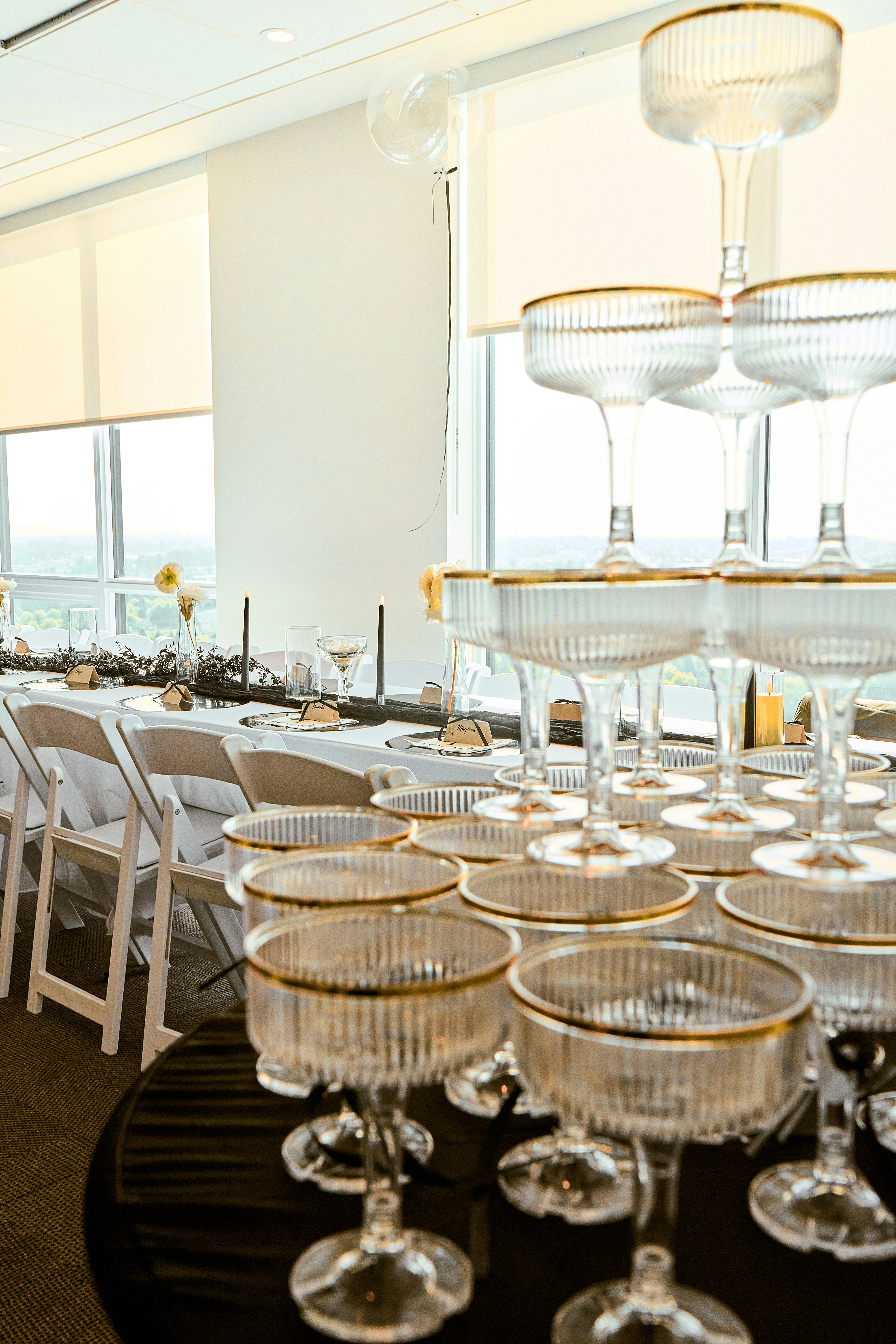 Glass Stack Gala: A Luminous Table of Echoing Reflections
