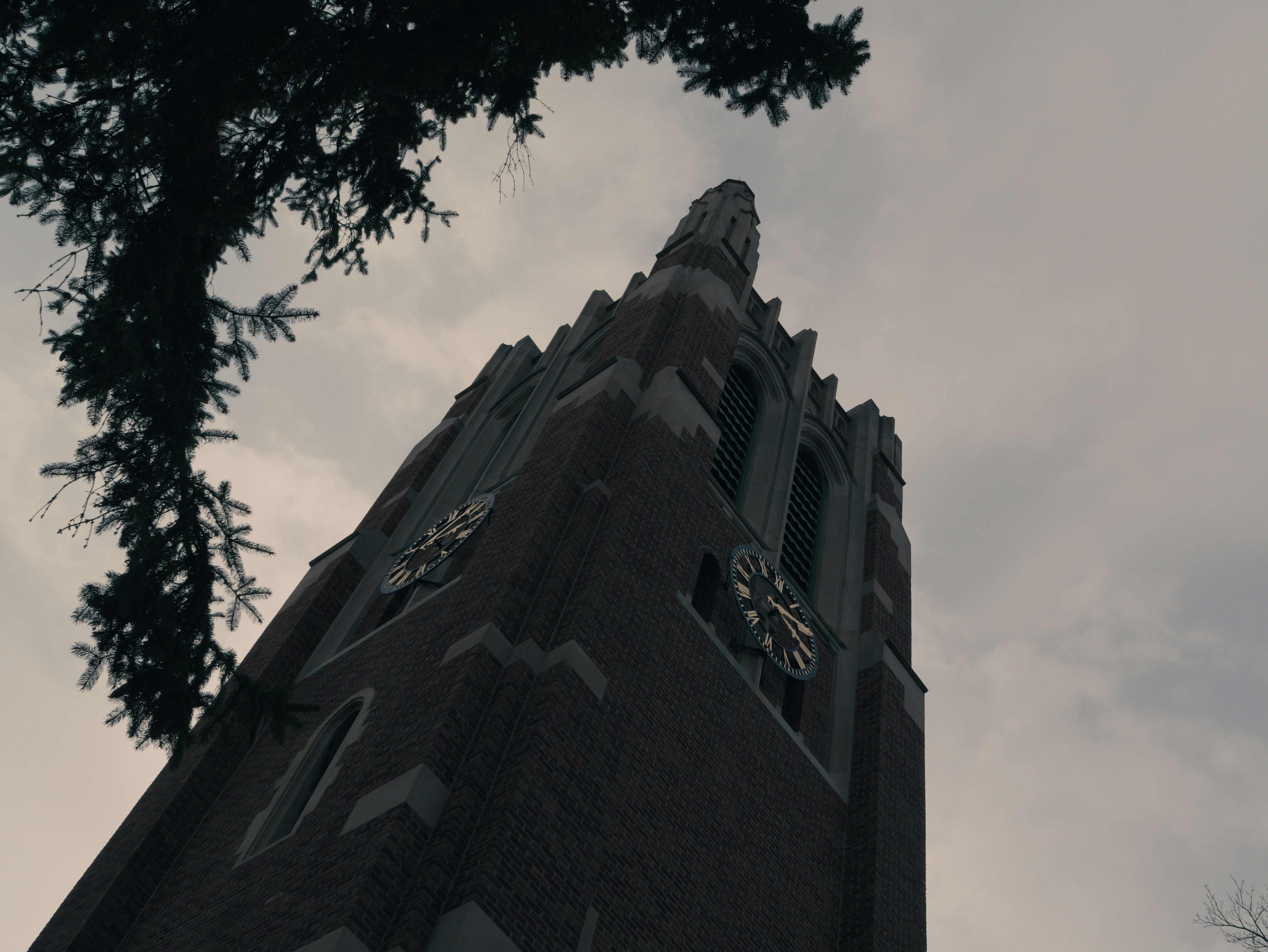 Urban Clocktower Reaching Toward a Moody Sky
